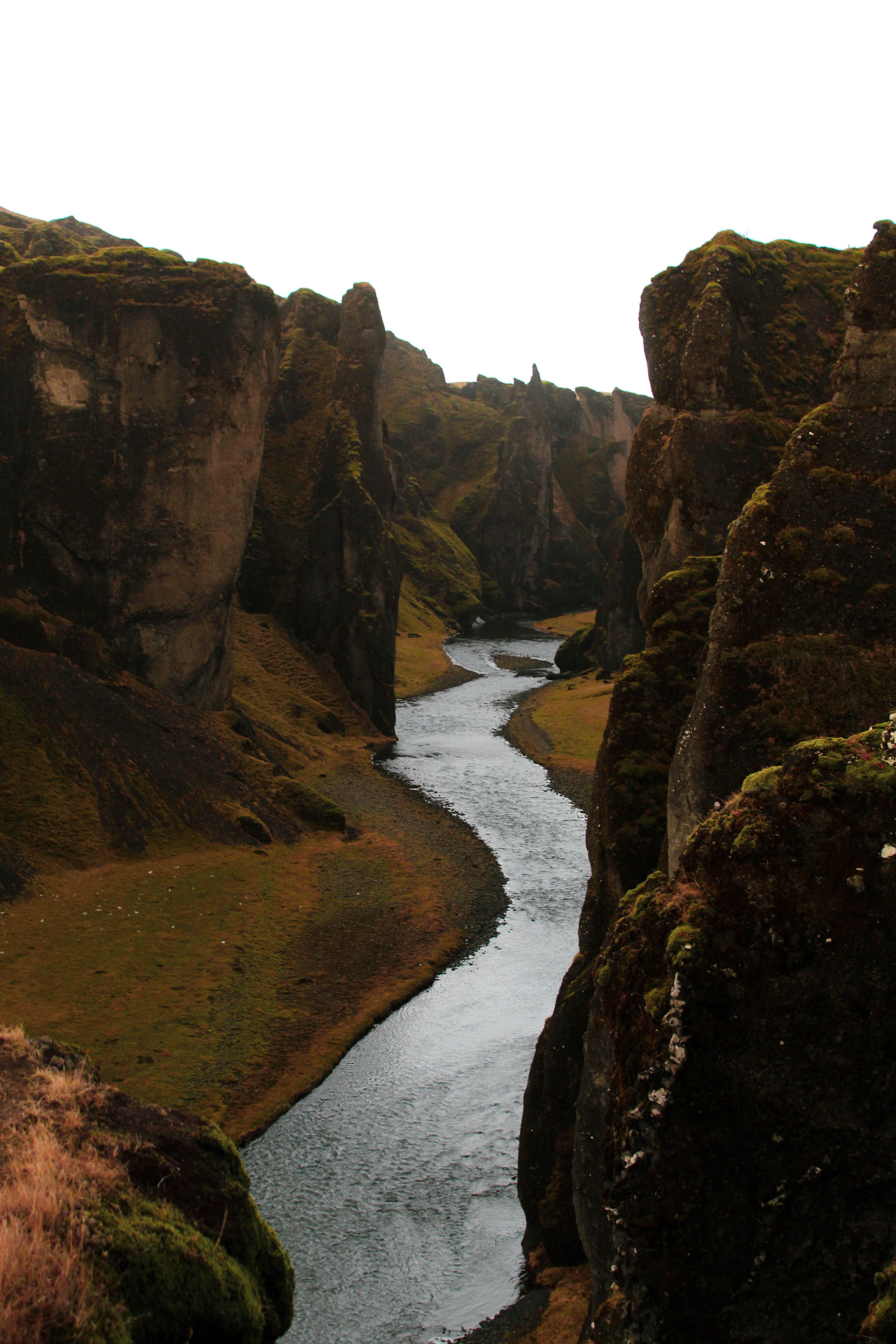 A Narrow River Between Mountains · Free Stock Photo