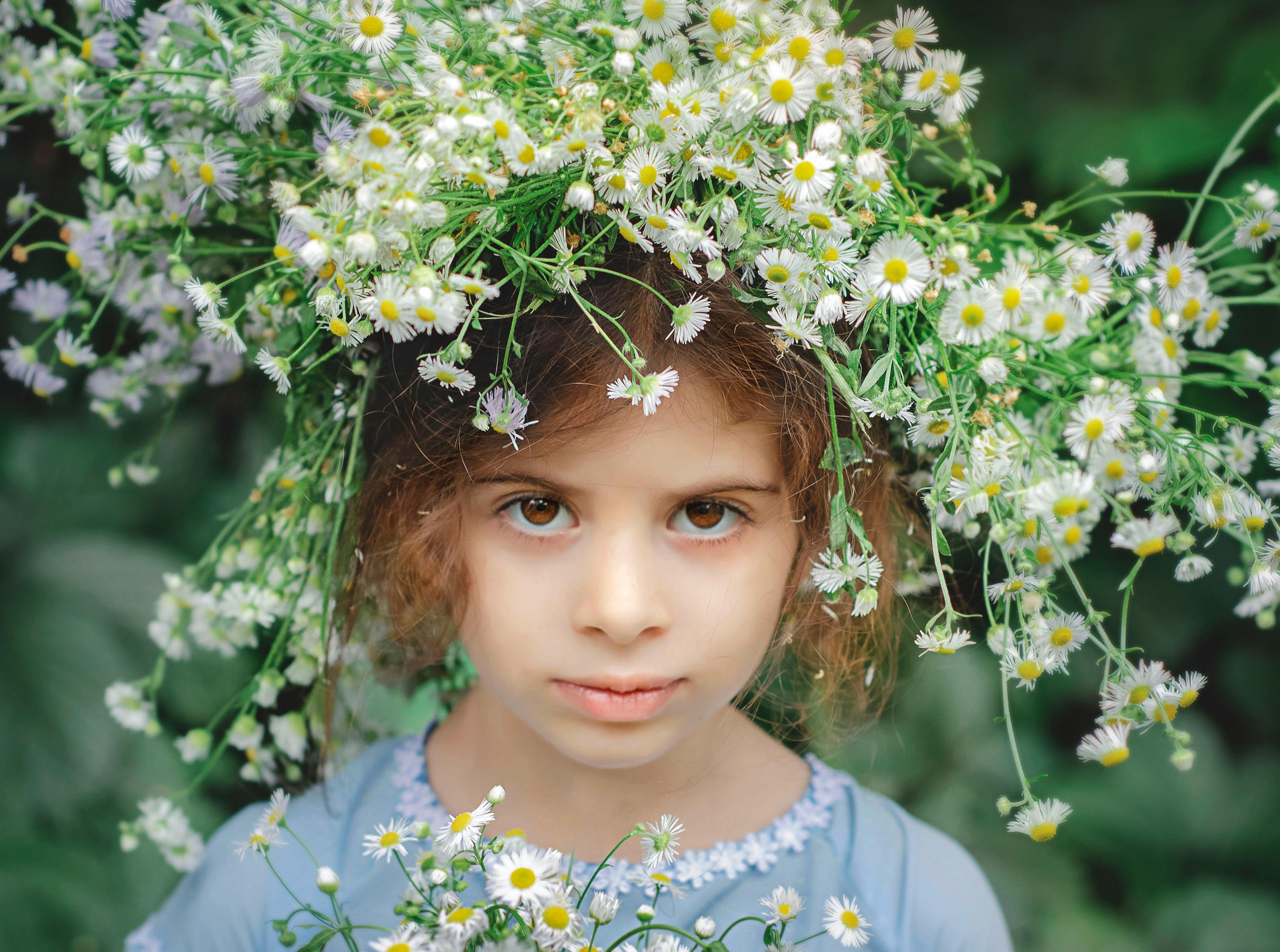 Little girl with chaplet on head · Free Stock Photo