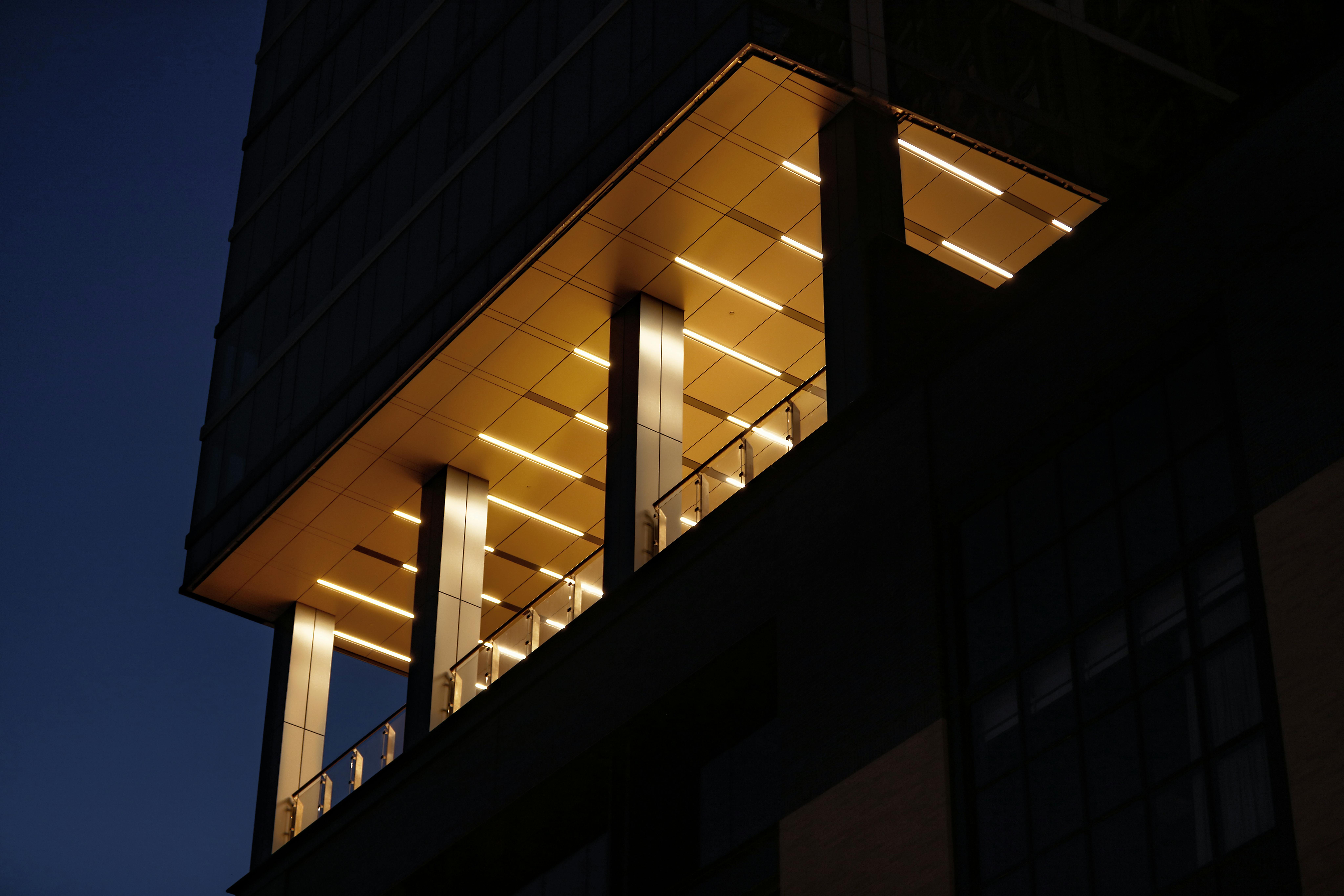 A Low Angle Shot of a Building at Night · Free Stock Photo