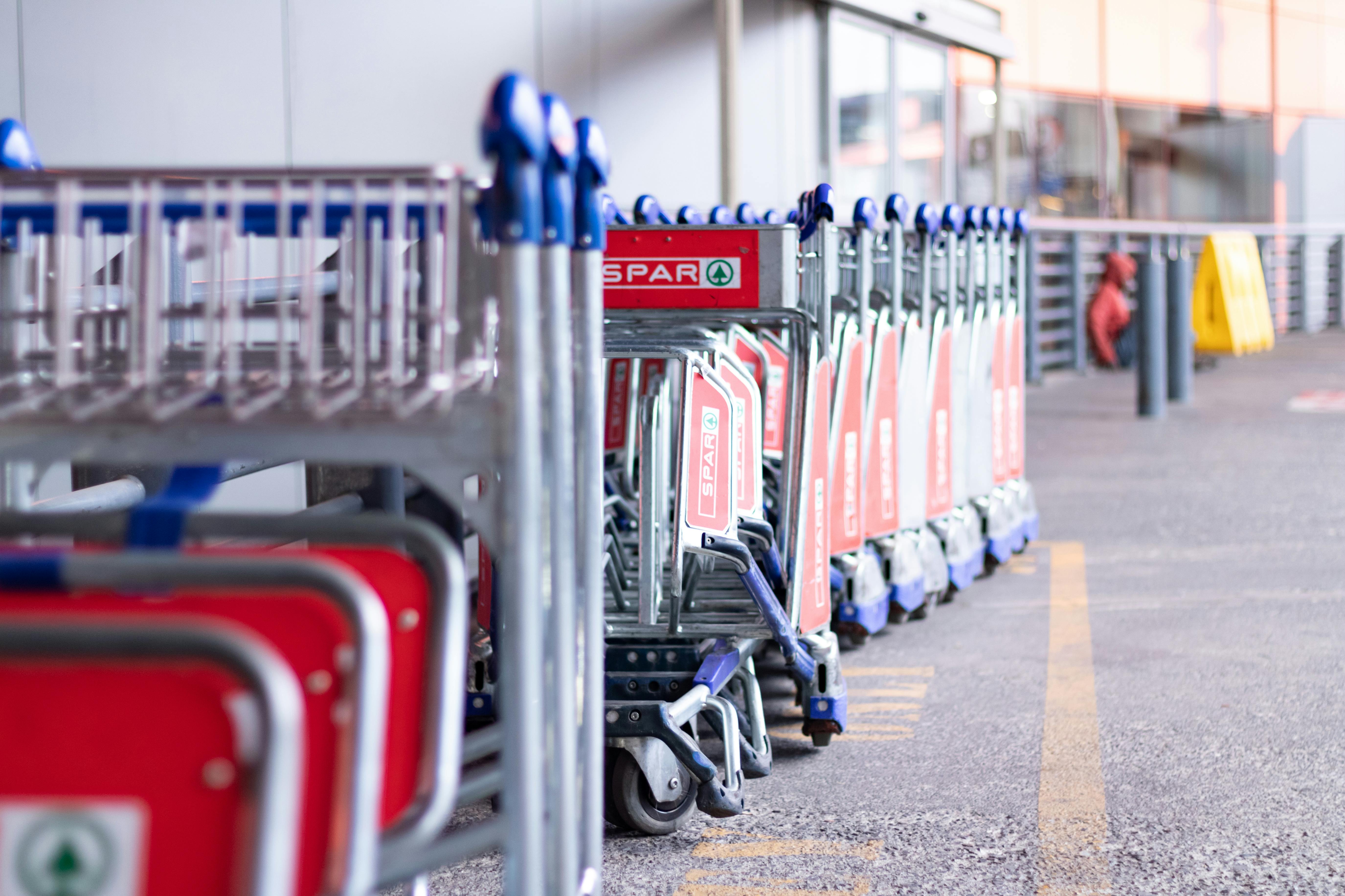 Person Pulling a Black Trolley Bag · Free Stock Photo