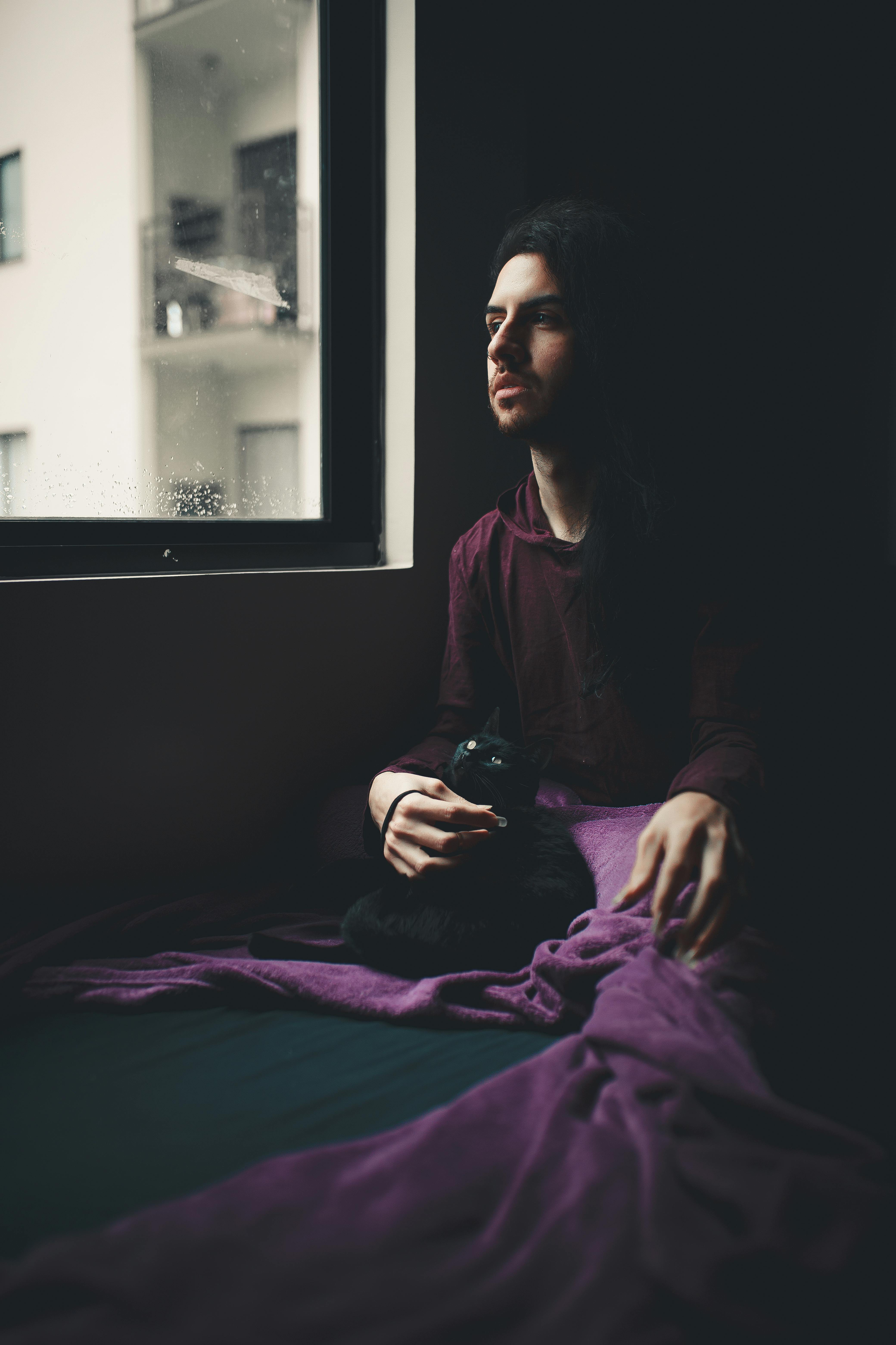 A Person Looking to the Window · Free Stock Photo