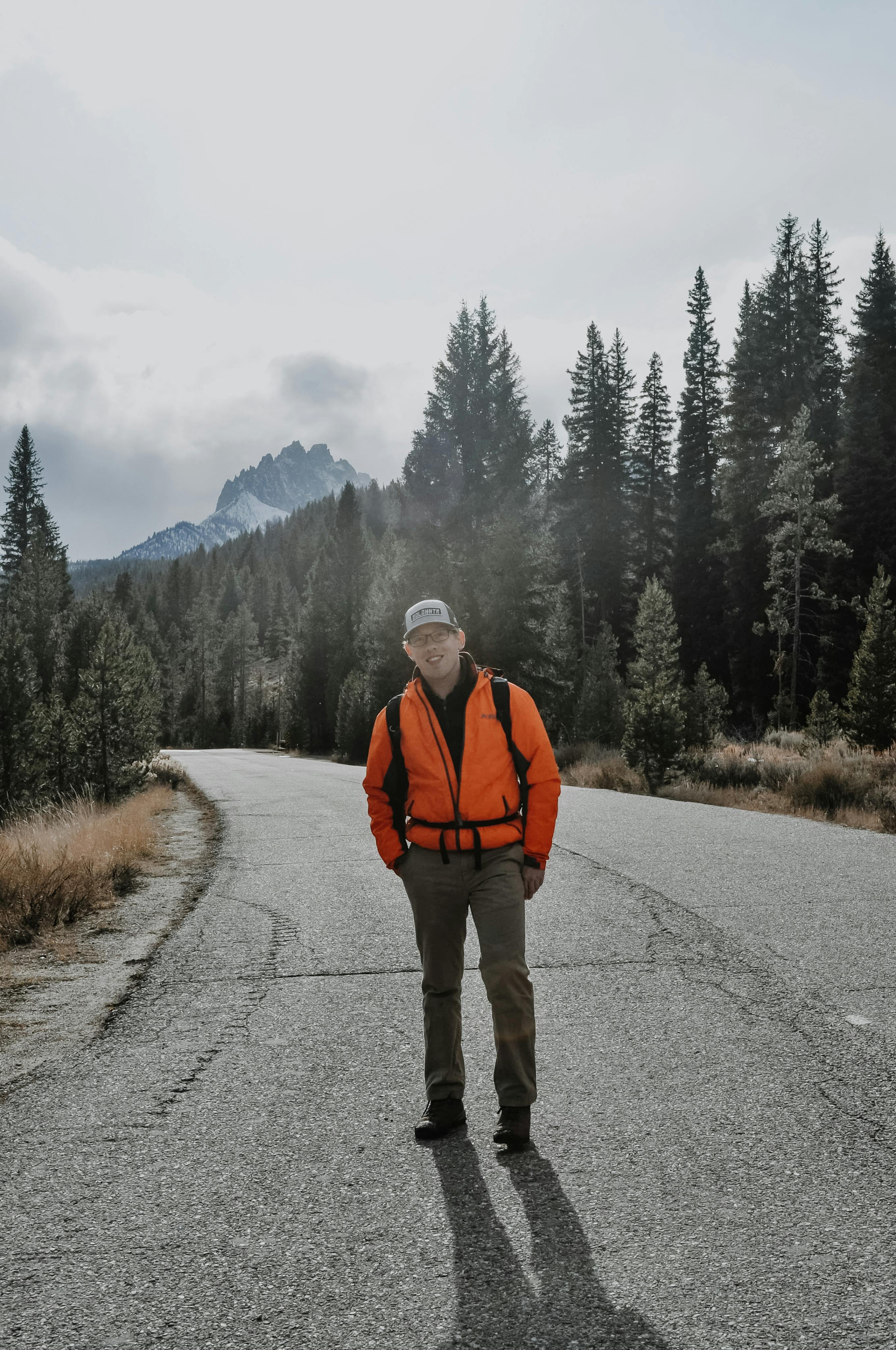 Man Holding a Flashlight Standing on Road during Nighttime · Free Stock ...