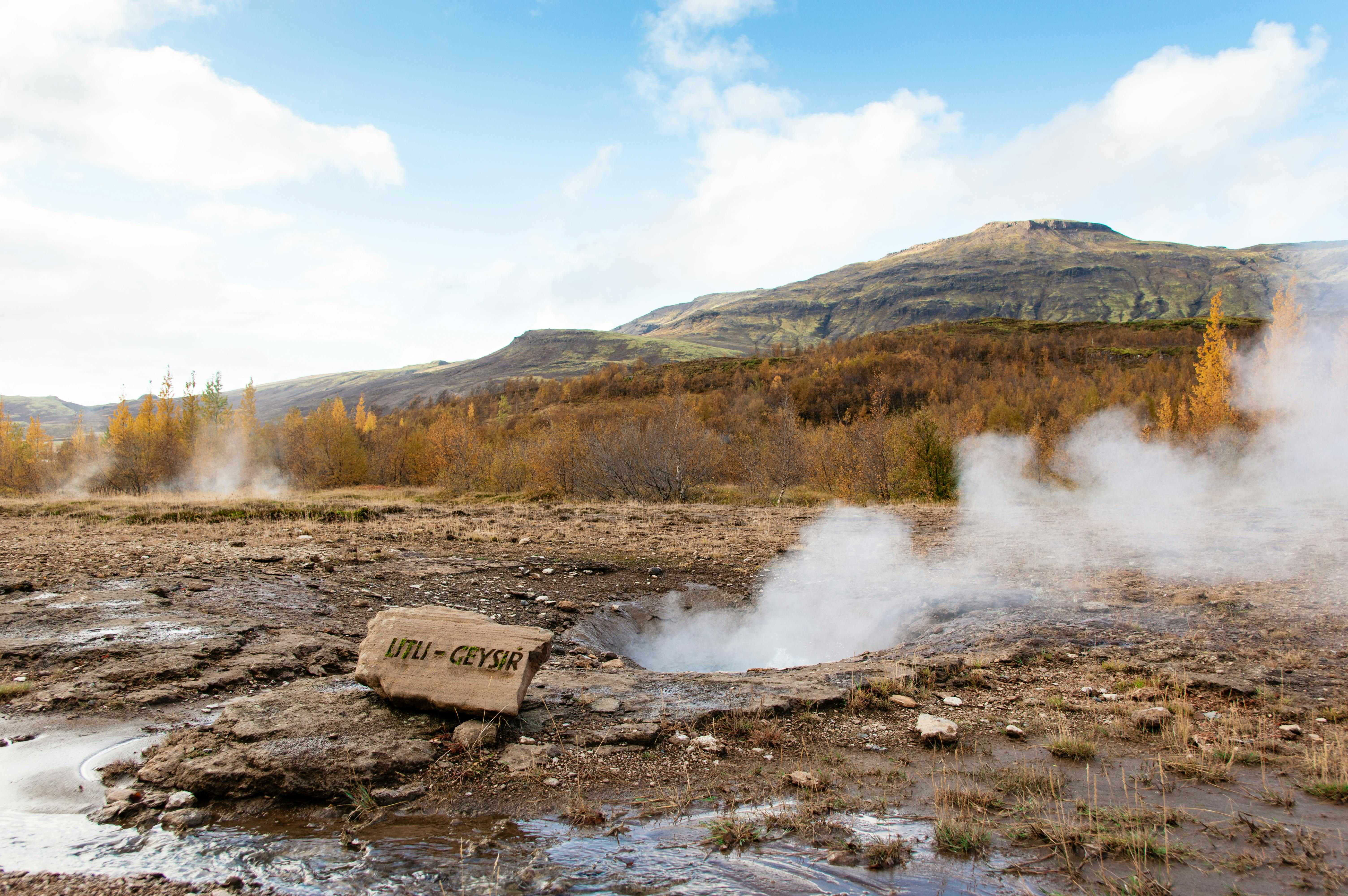 Mineral hot springs in geothermal area against overcast day · Free ...