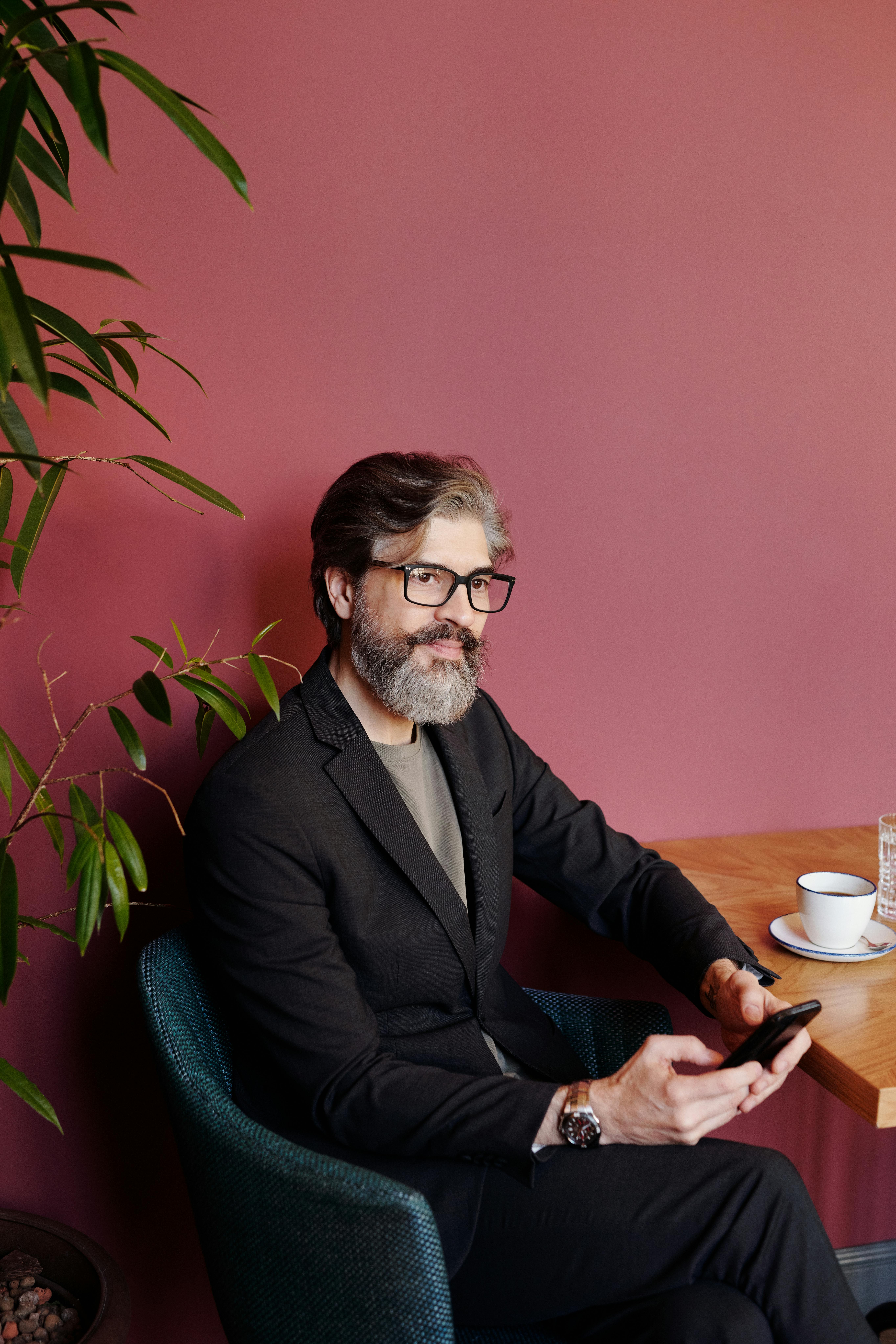 Man Getting Coffee in a Cafeteria · Free Stock Photo