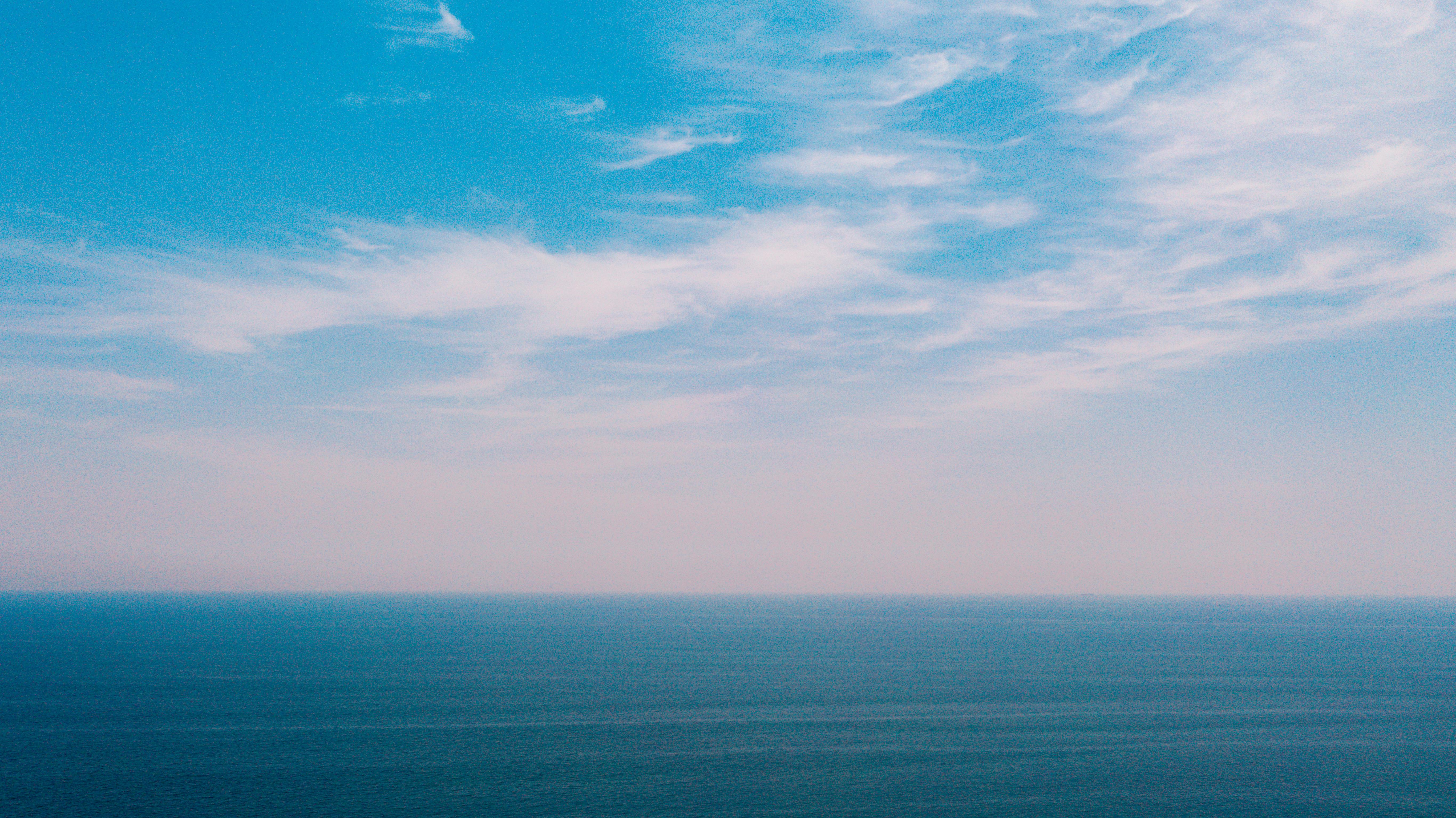 Horizon of calm blue sea in daylight · Free Stock Photo