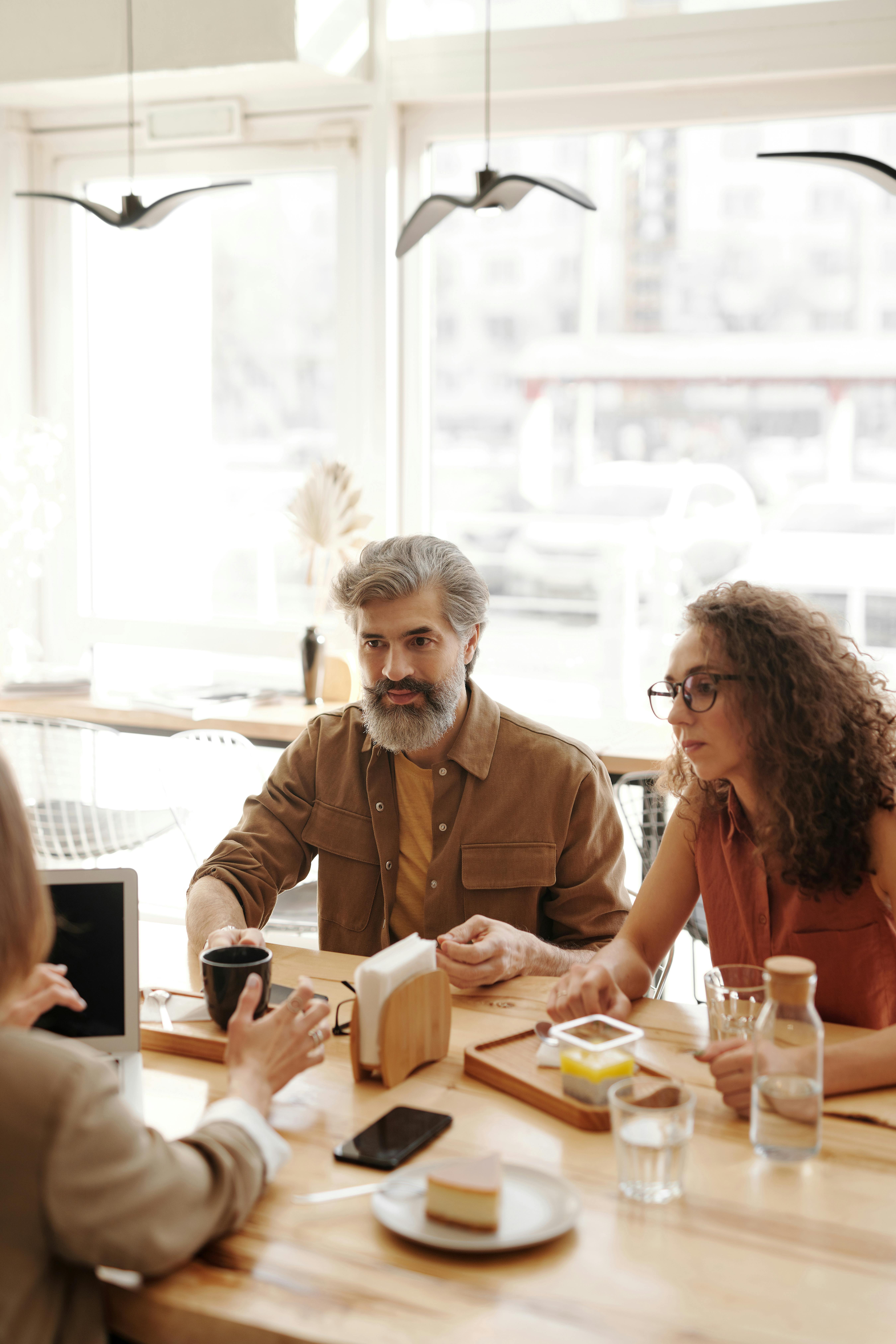 Men Talking While Having Coffe · Free Stock Photo