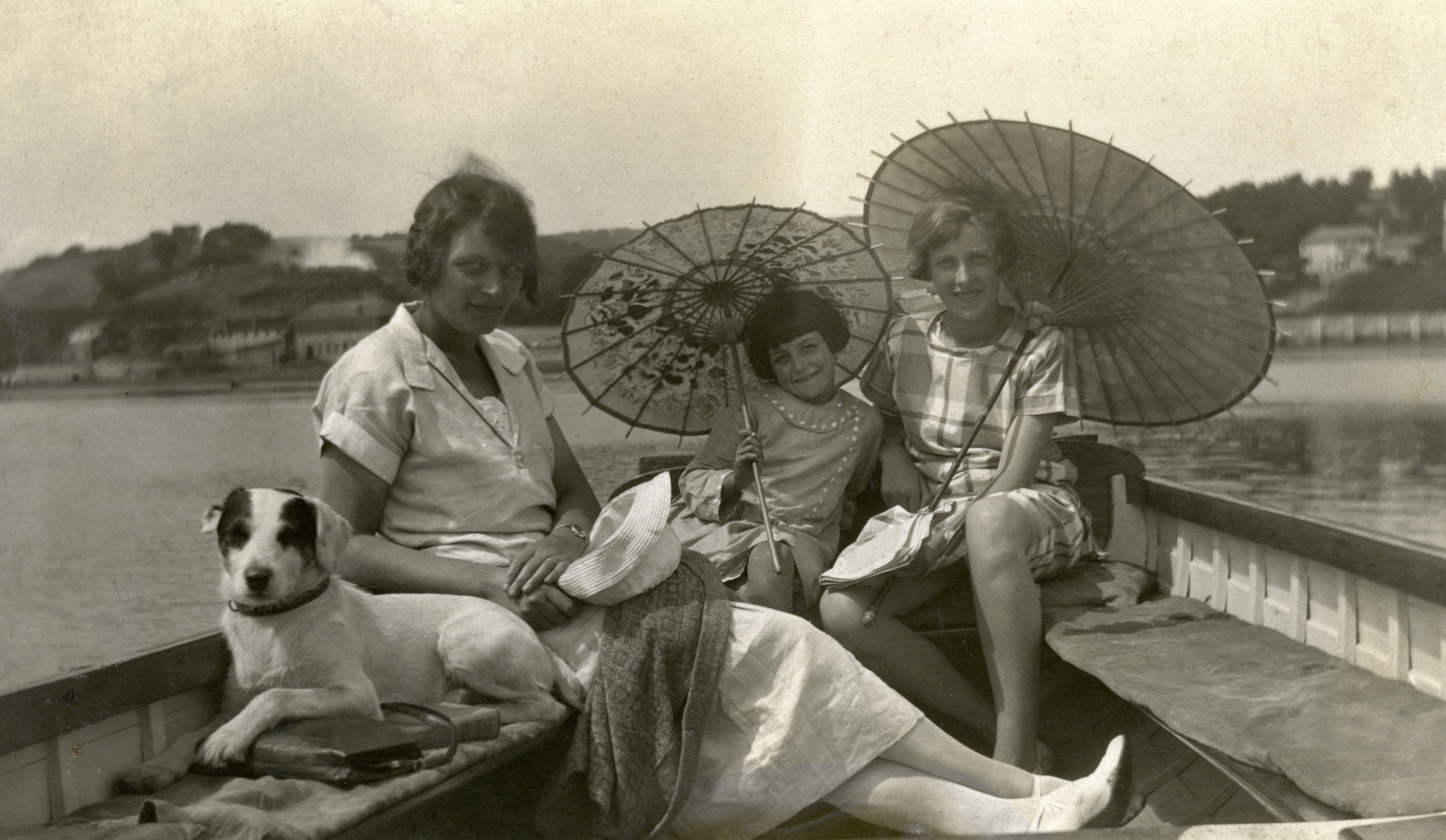 Old Picture of a Woman with Two Daughters and a Dog in Boat on River ...