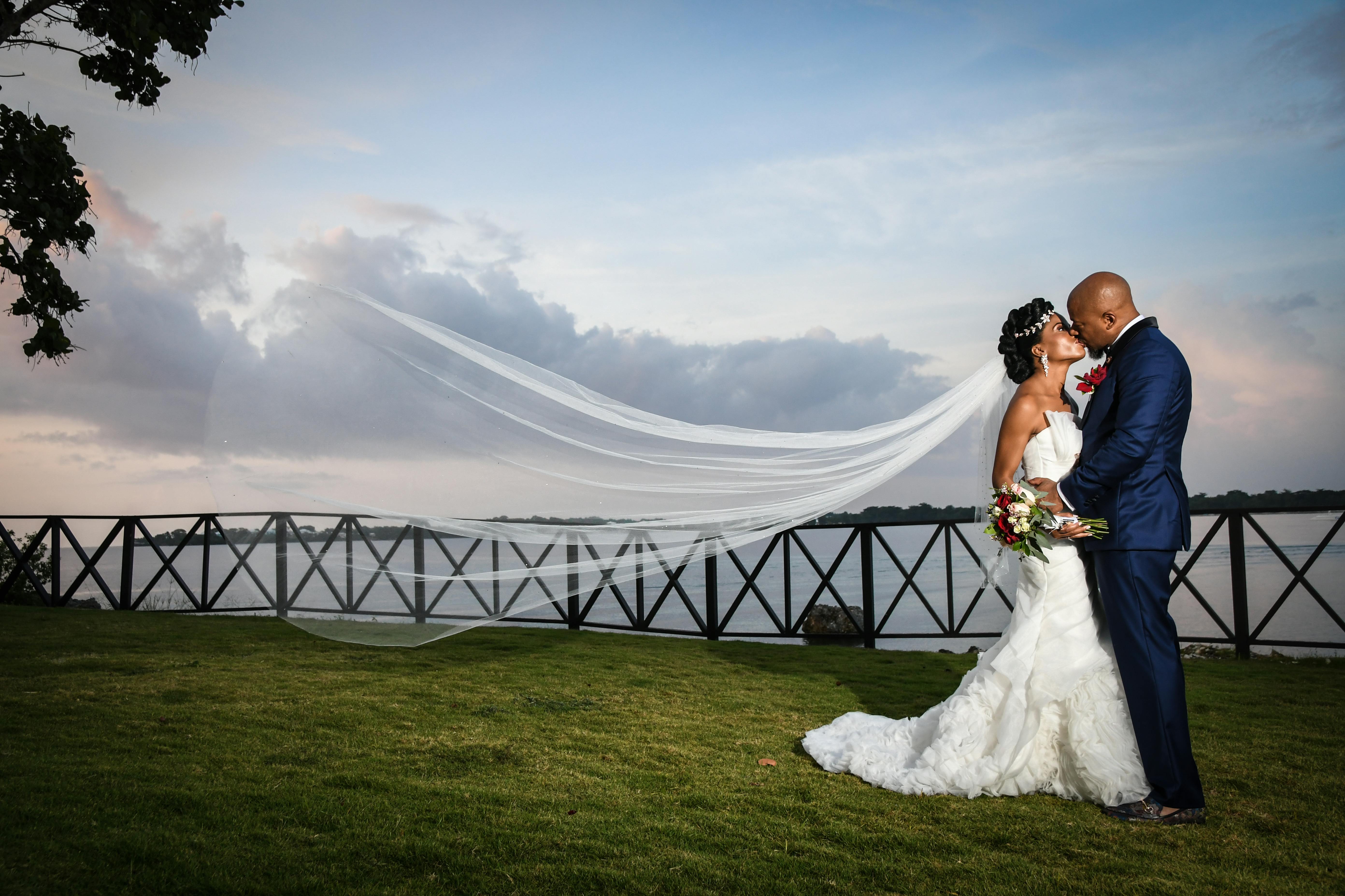 A Black Couple in a Beach Wedding · Free Stock Photo