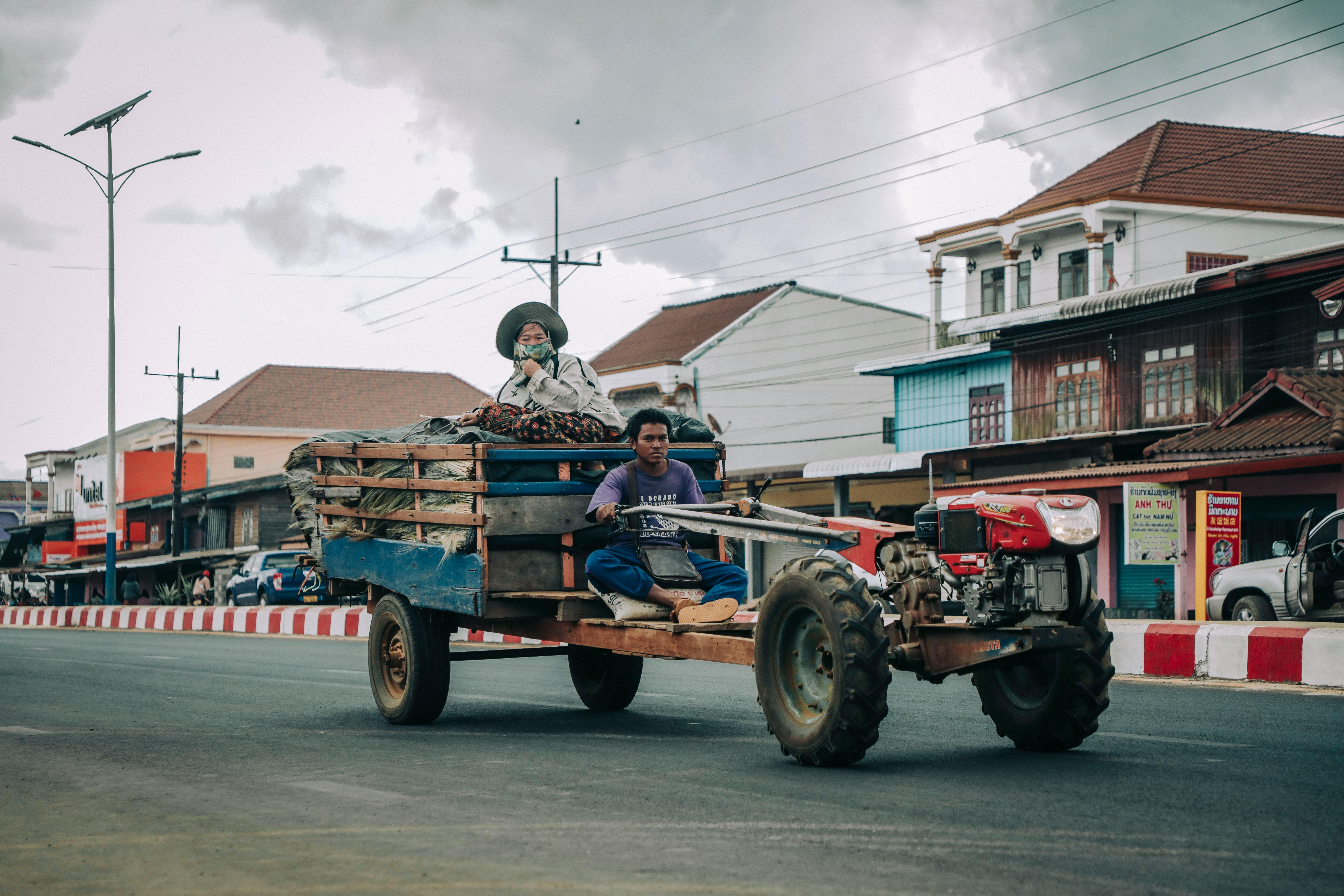 People Riding on Tractor · Free Stock Photo