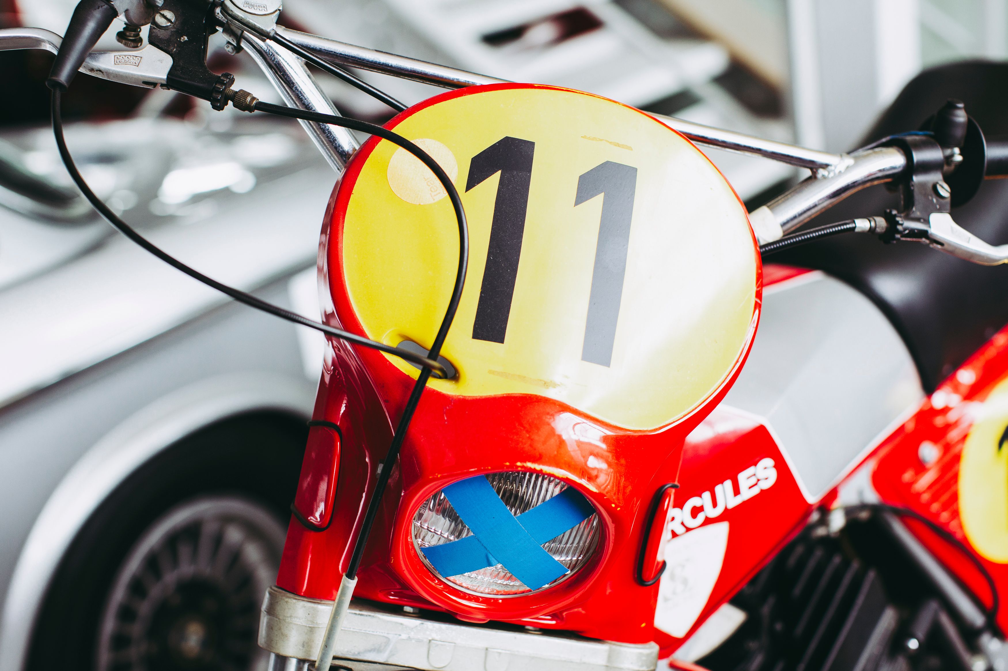 Close-Up Shot of Red and Yellow Motorbike · Free Stock Photo