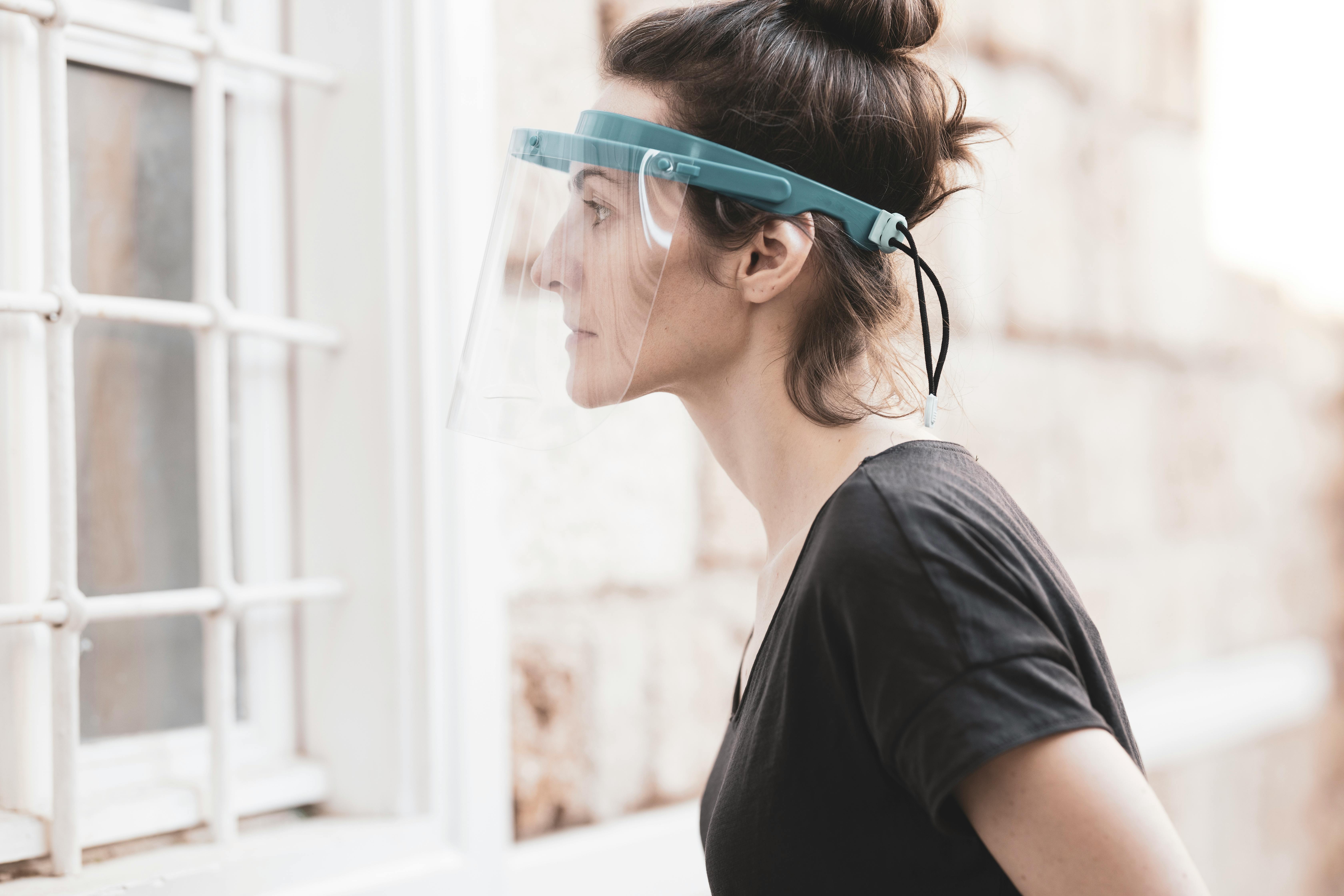 A Woman Wearing a Face Shield · Free Stock Photo