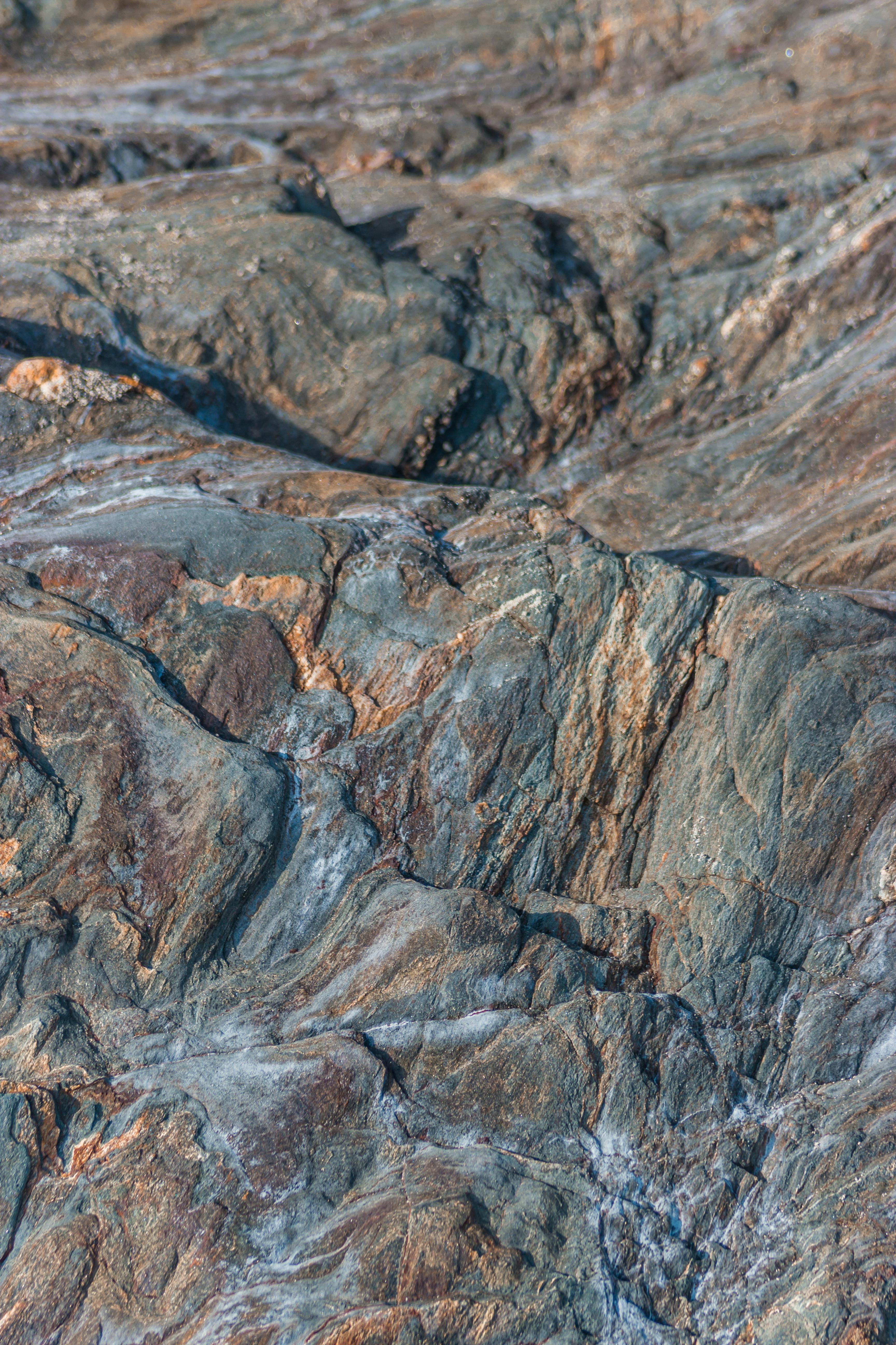 Rocky terrain in mountain valley in sunlight · Free Stock Photo