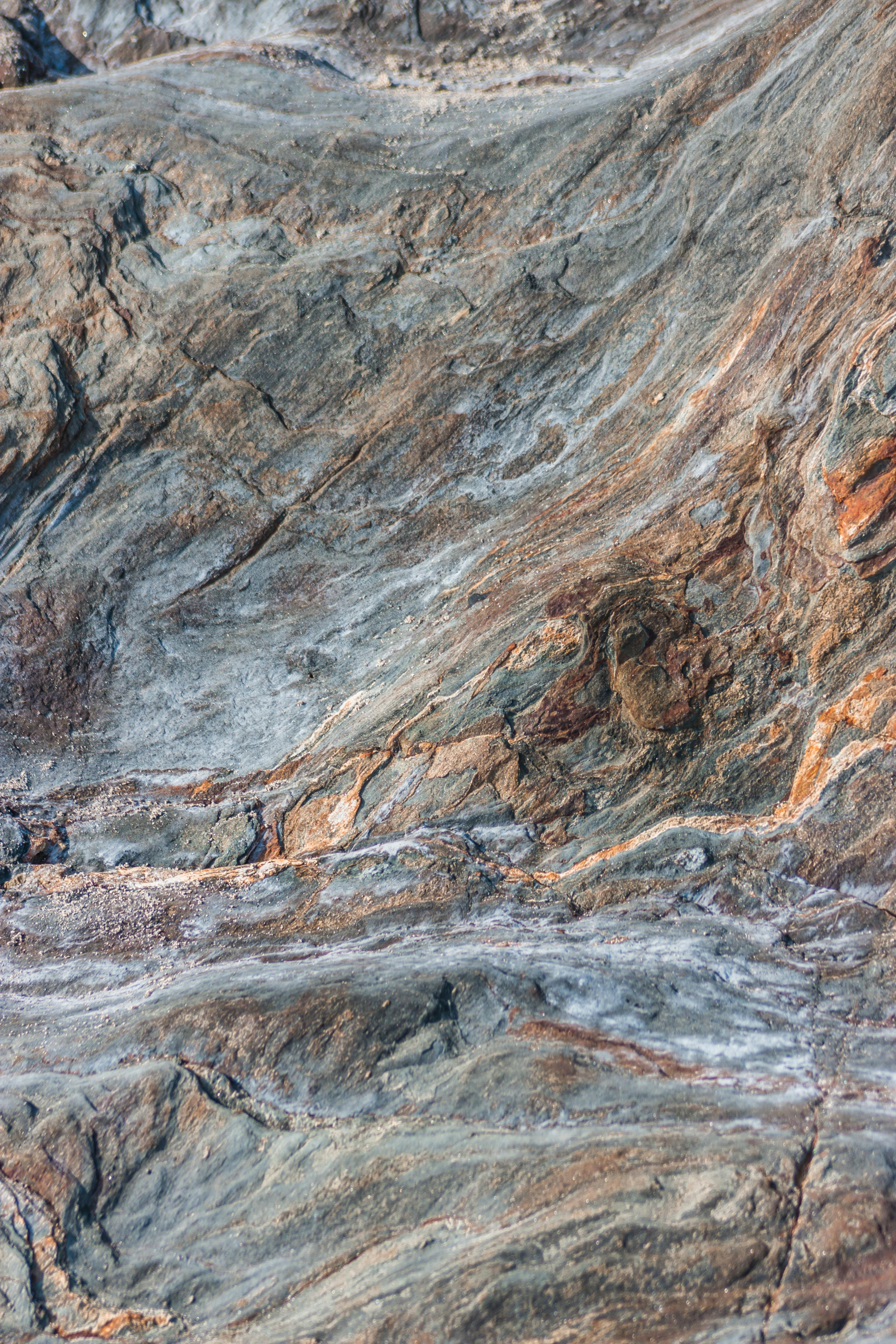 Multi colored formation of rocks · Free Stock Photo