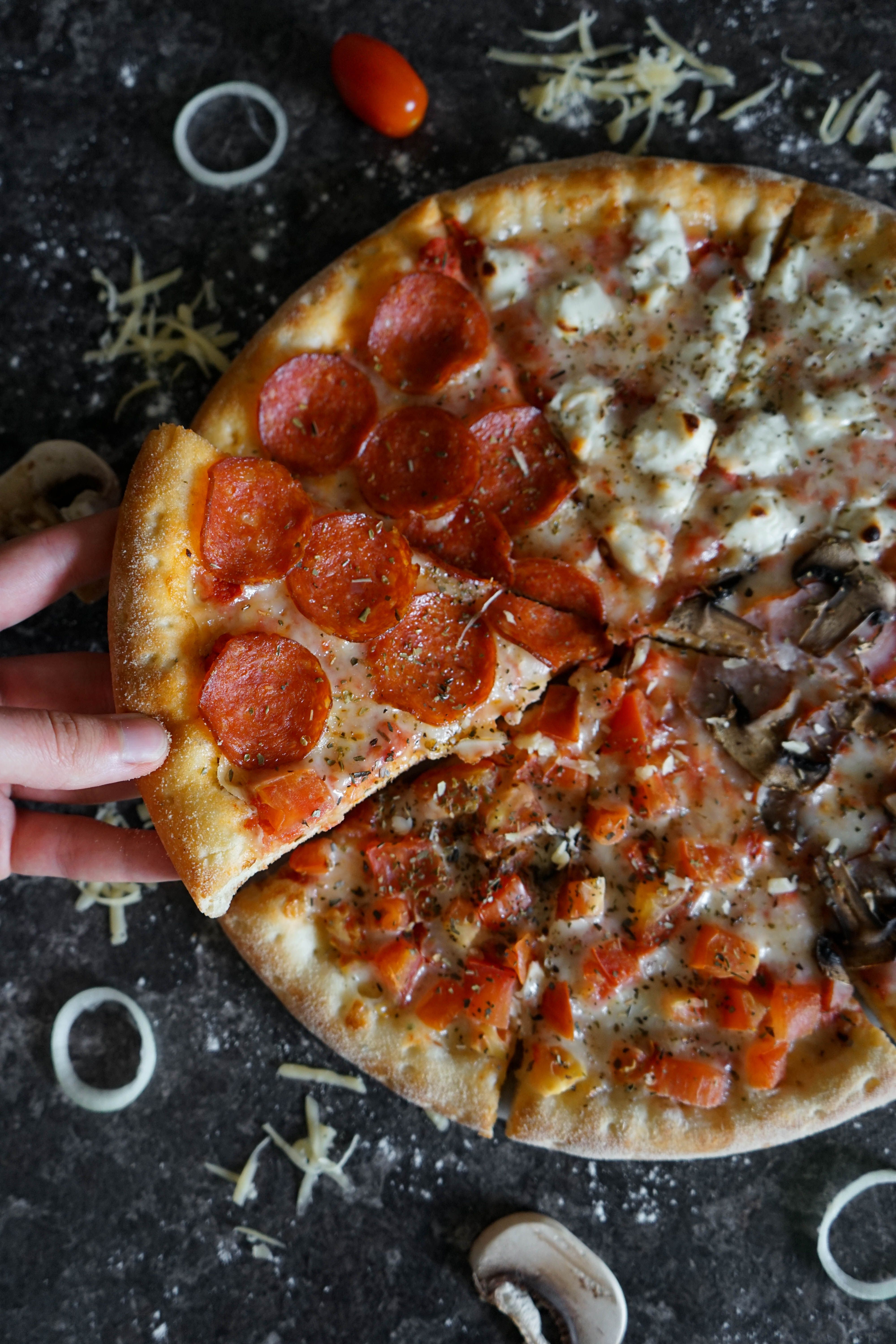Appetizing assorted pizza with meat products and vegetables · Free ...
