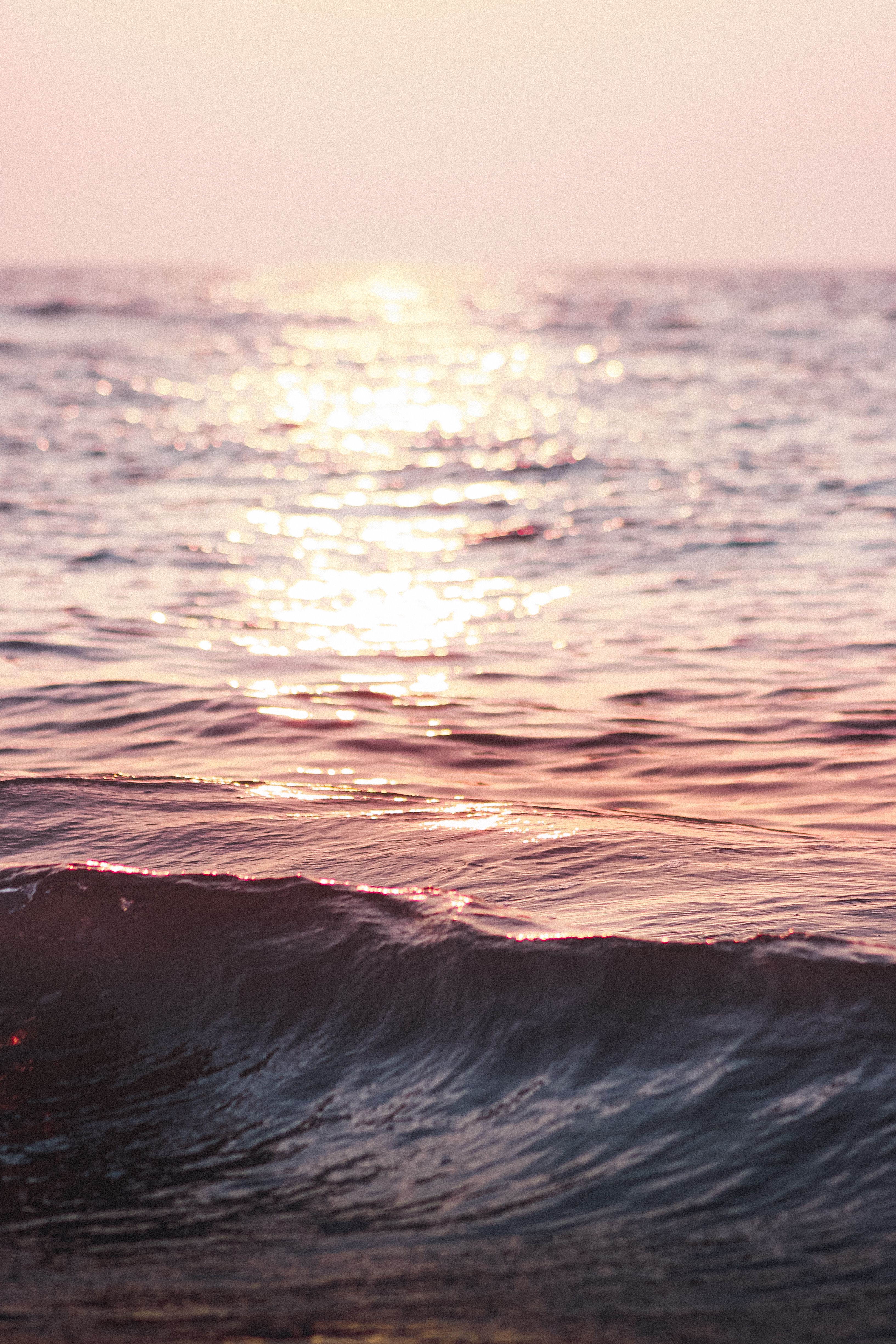 Waving sea with reflection of sunshine in water · Free Stock Photo