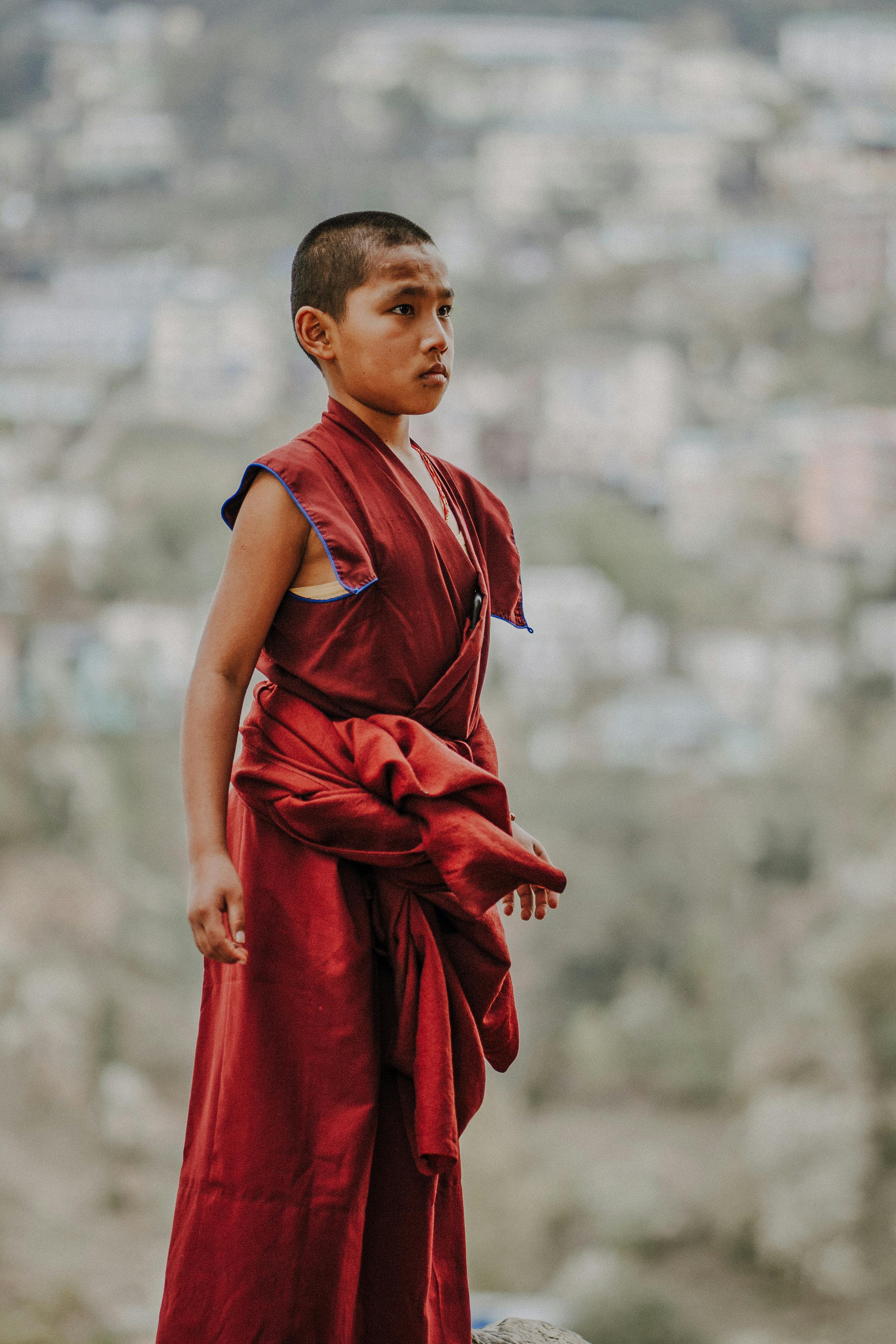 A Boy in Red Monk Robes · Free Stock Photo