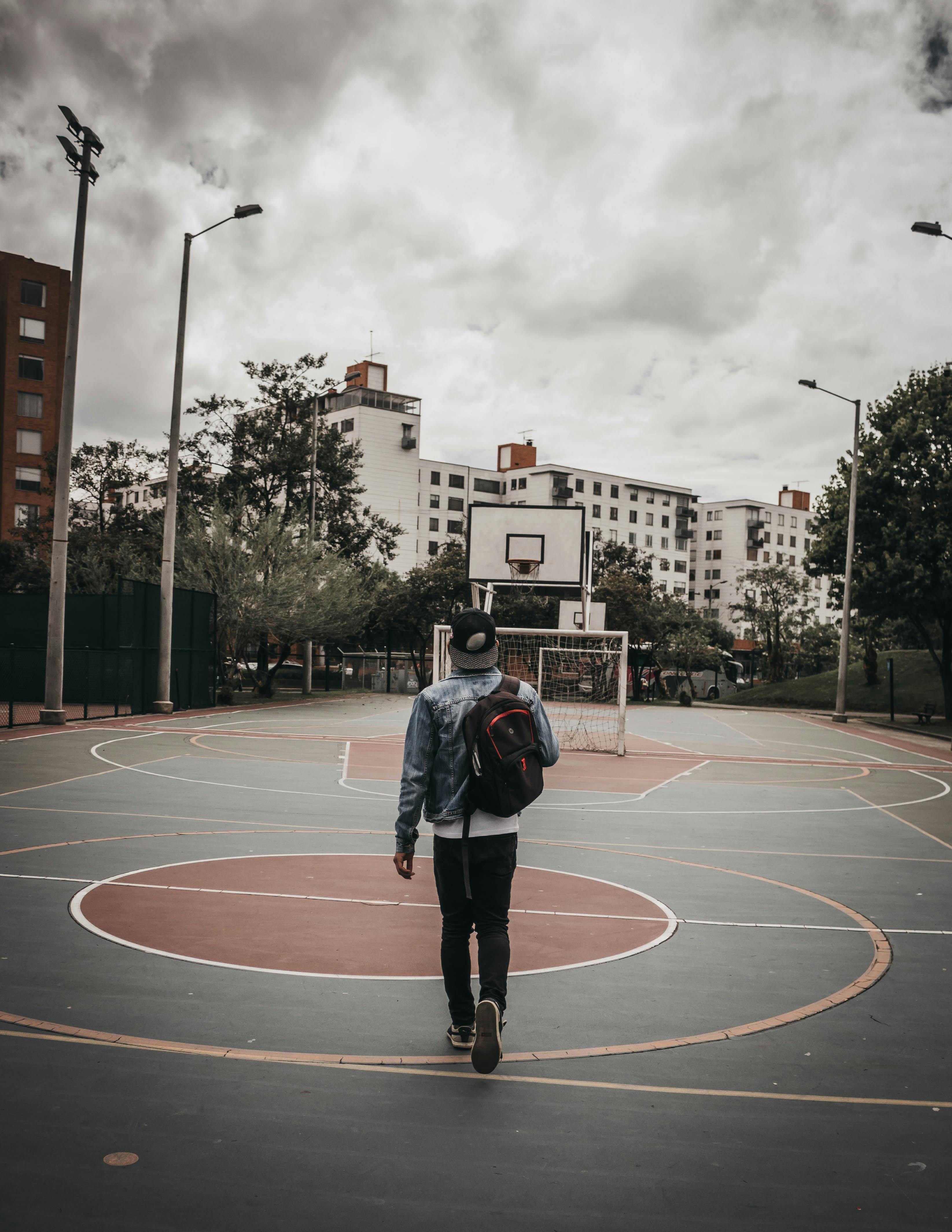 Man Carrying a Backpack · Free Stock Photo