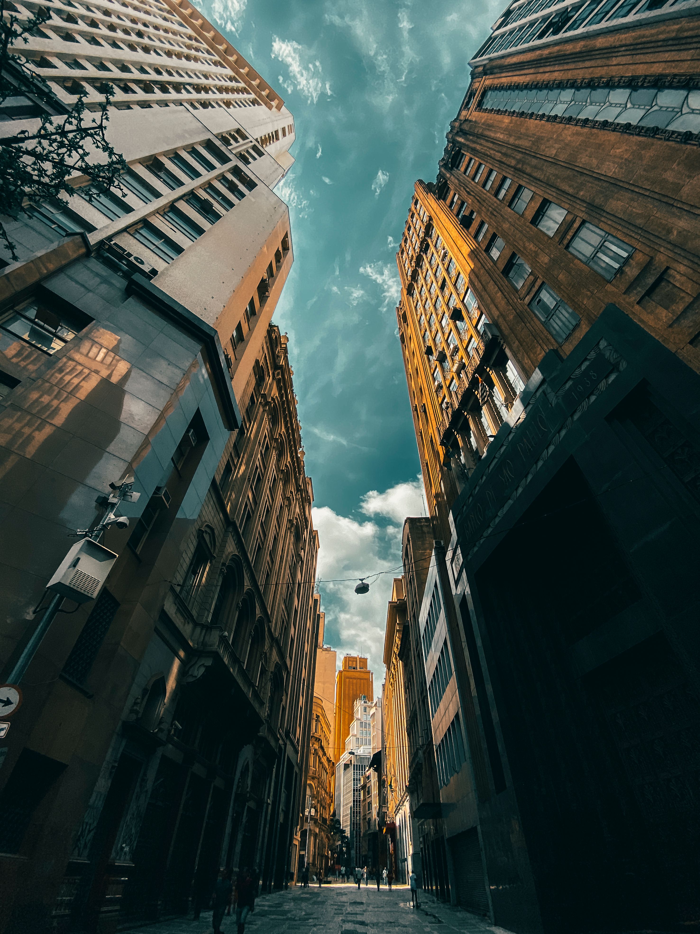 Modern buildings in city district on sunny day · Free Stock Photo