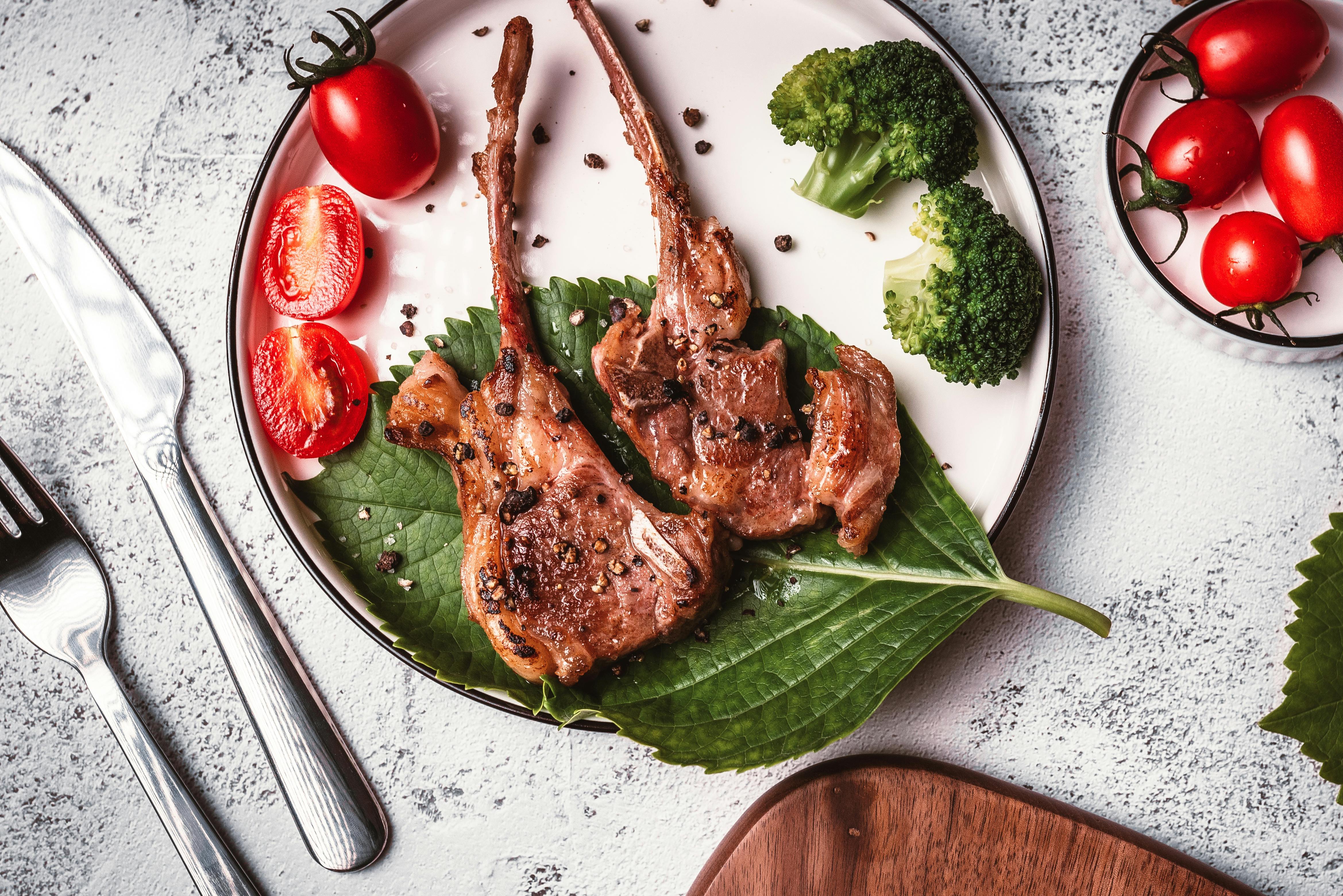 Cooked Meat With Green Vegetable on White Ceramic Plate · Free Stock Photo