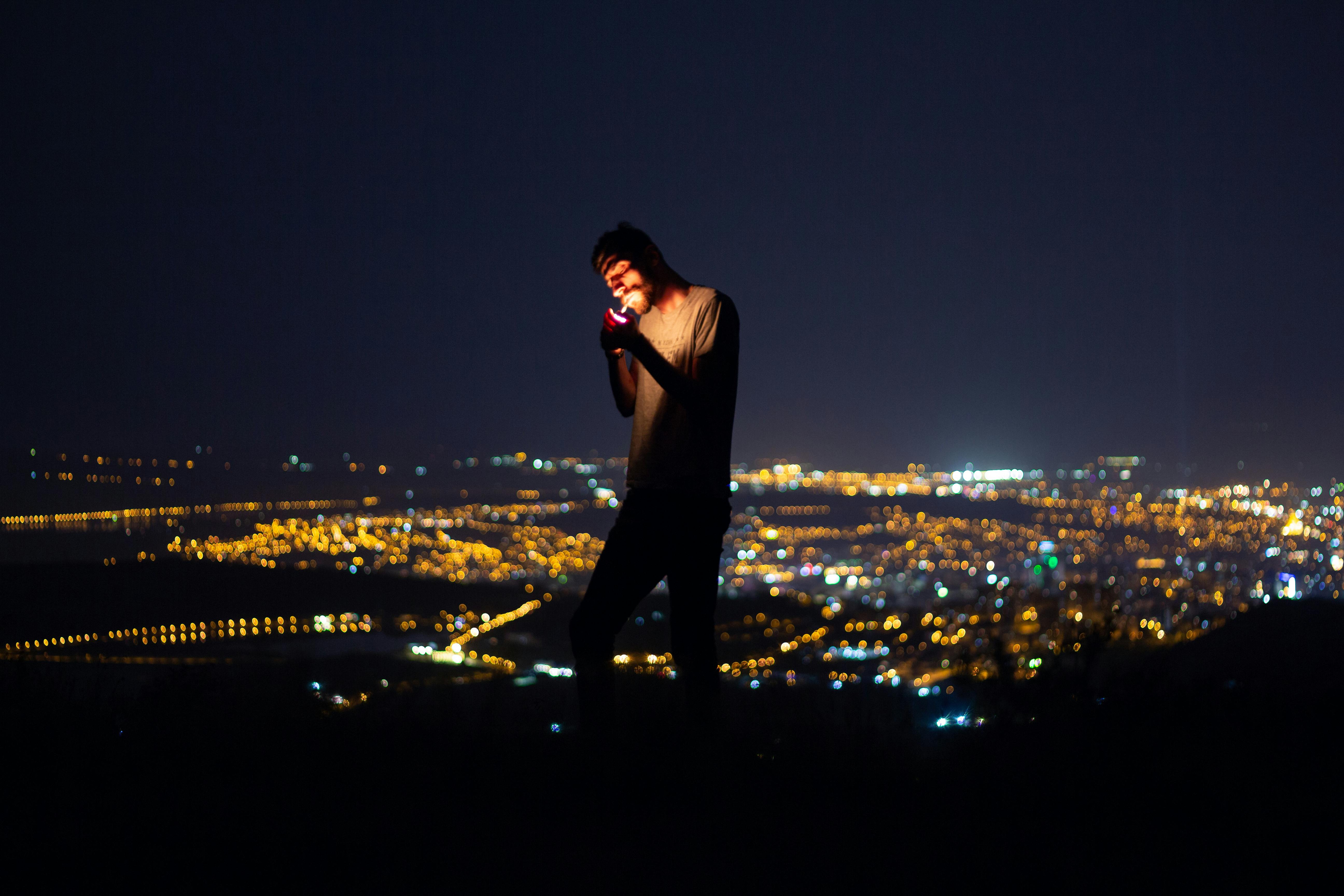 Man Holding Lighted Lantern · Free Stock Photo