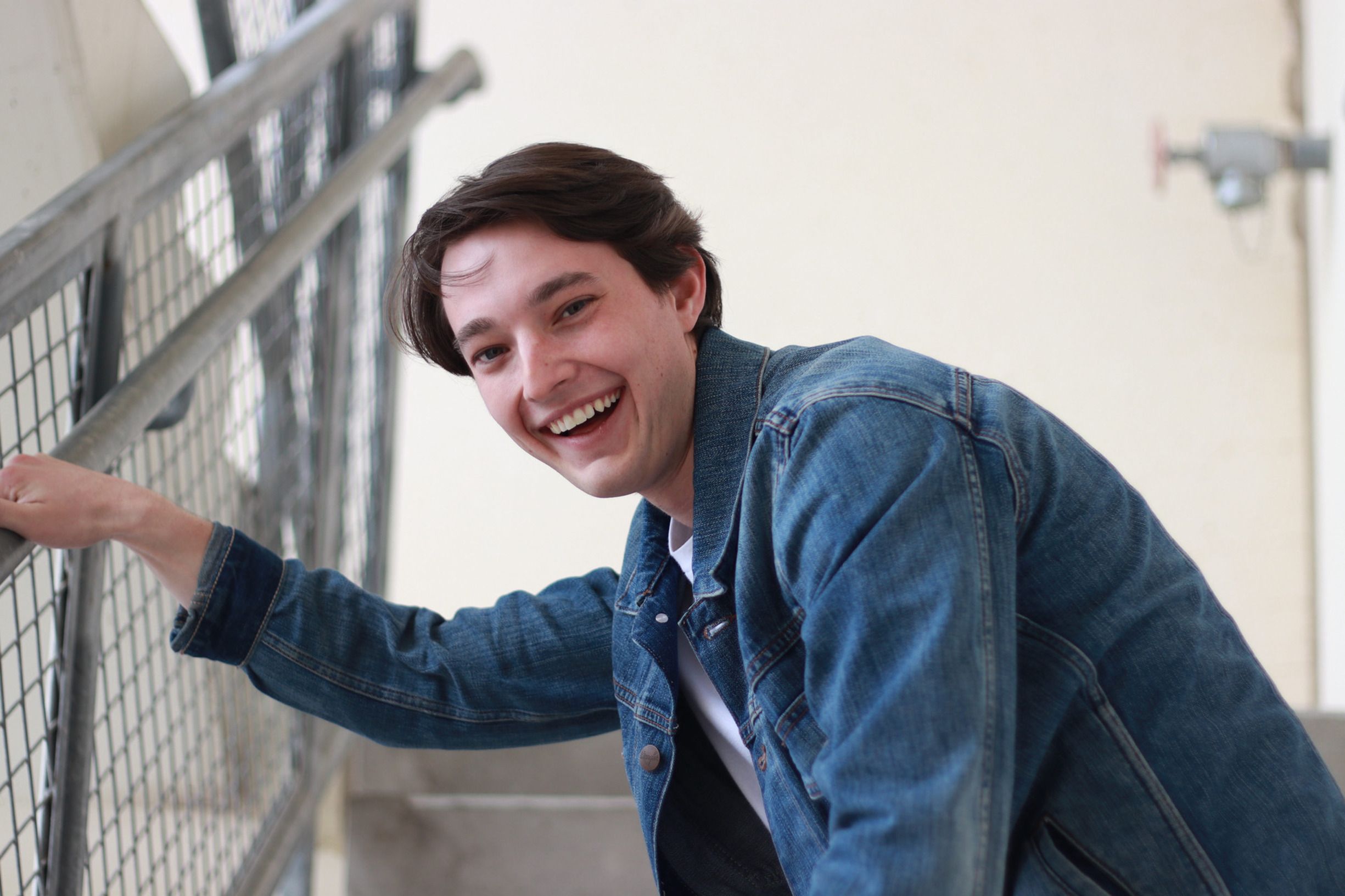 Smiling Man in Blue Denim Jacket · Free Stock Photo