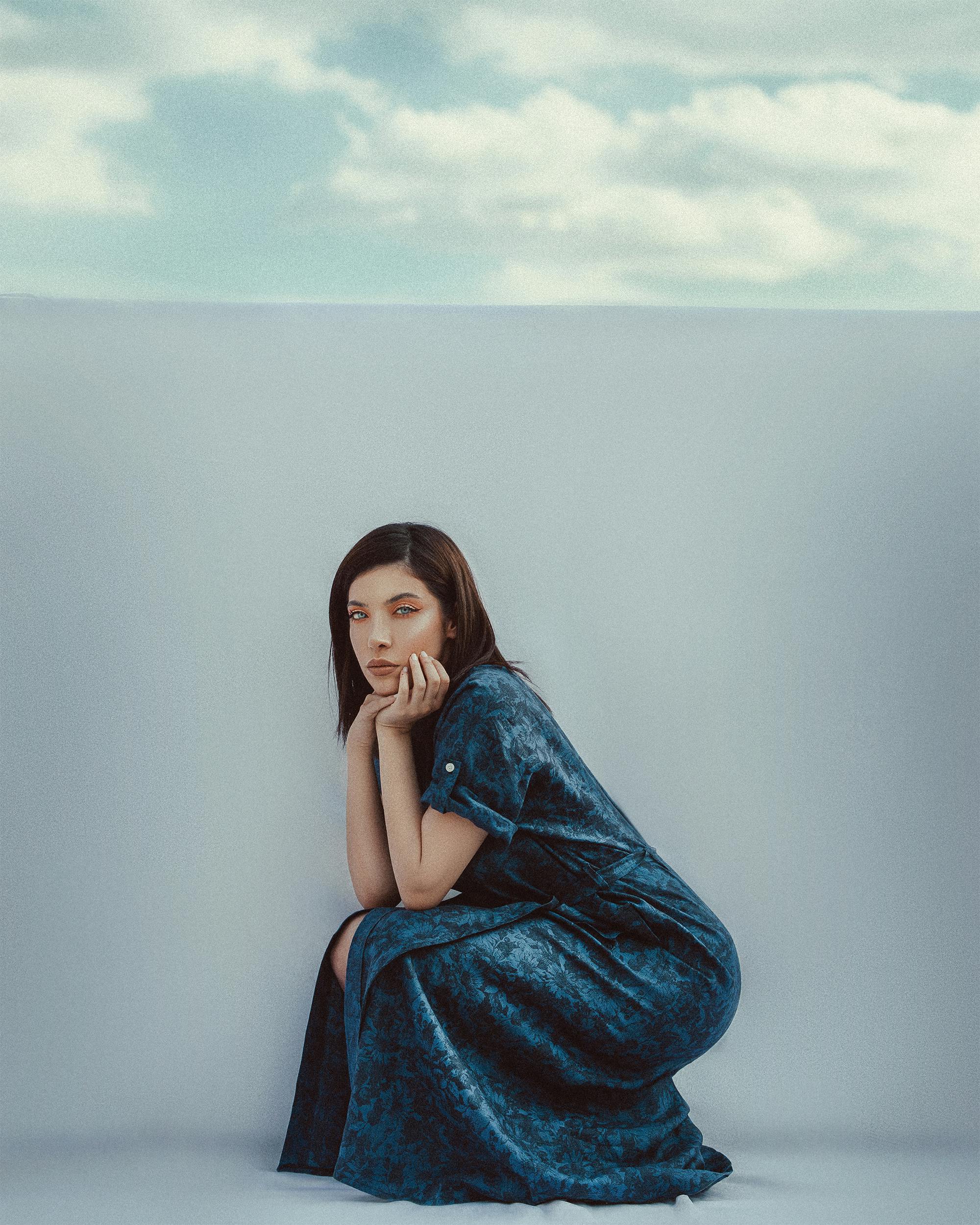 Photo of a Crouching Woman · Free Stock Photo