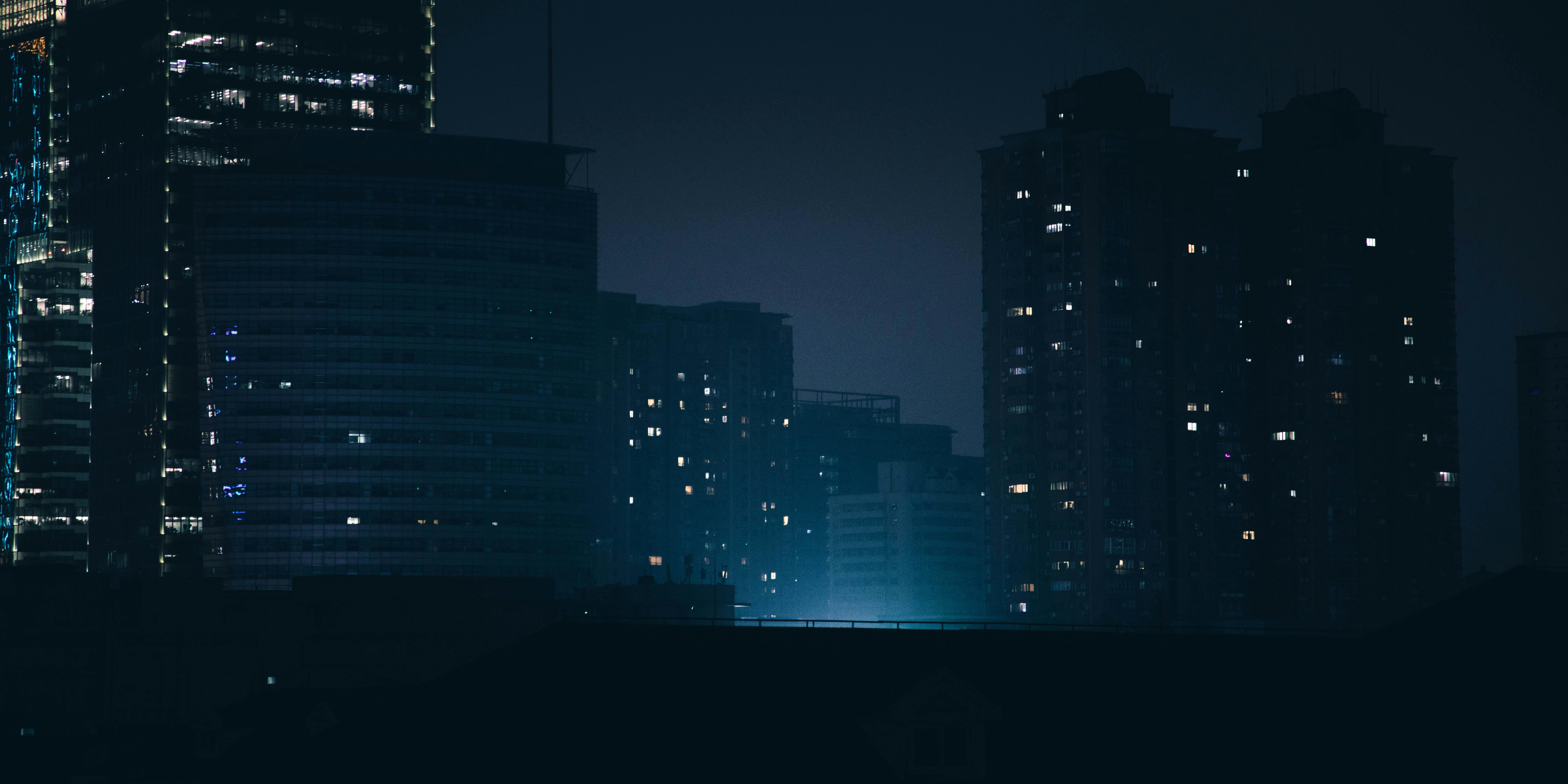 High Rise Buildings during Night Time · Free Stock Photo