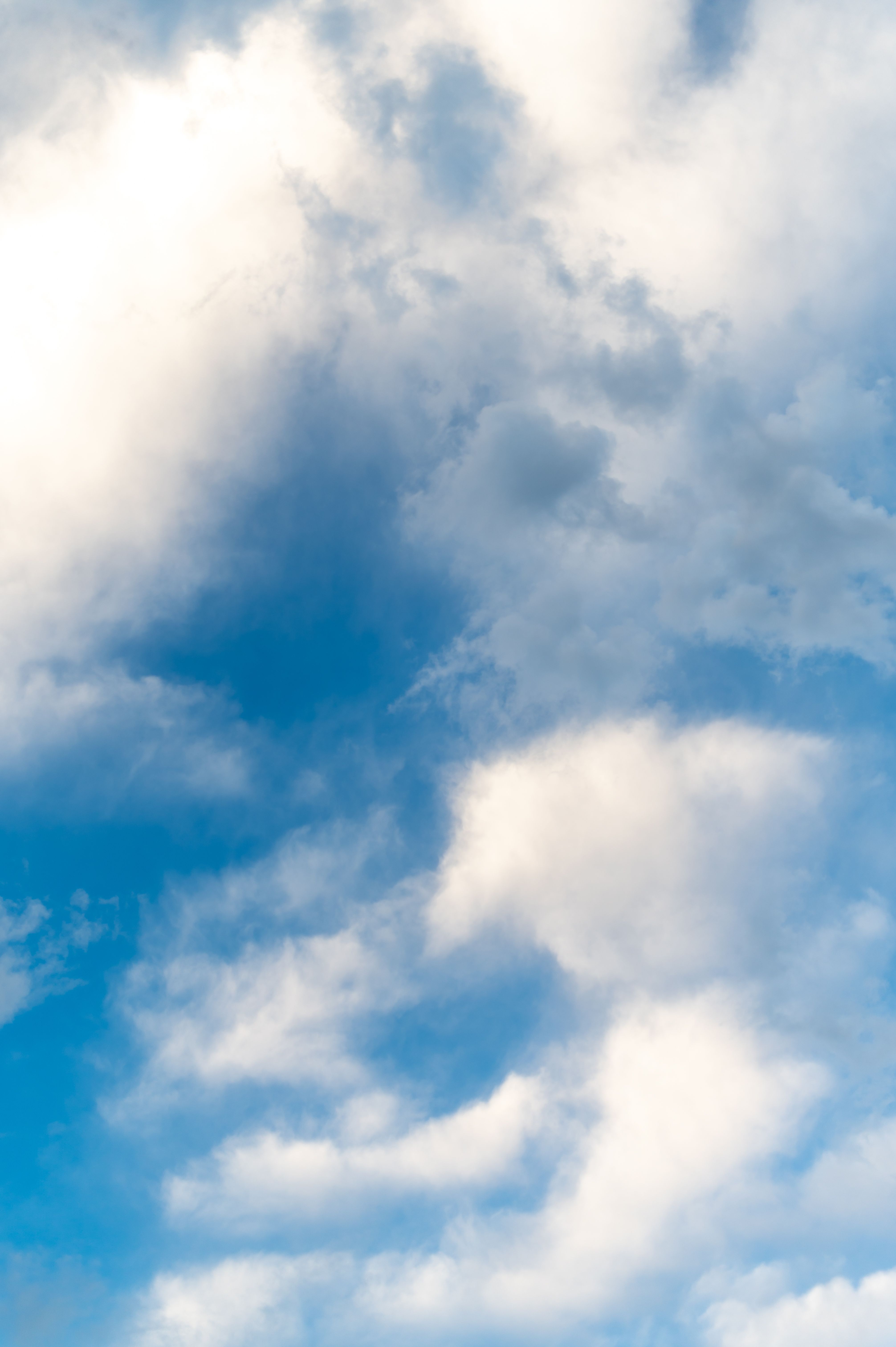 Blue sky with clouds in sunny day · Free Stock Photo