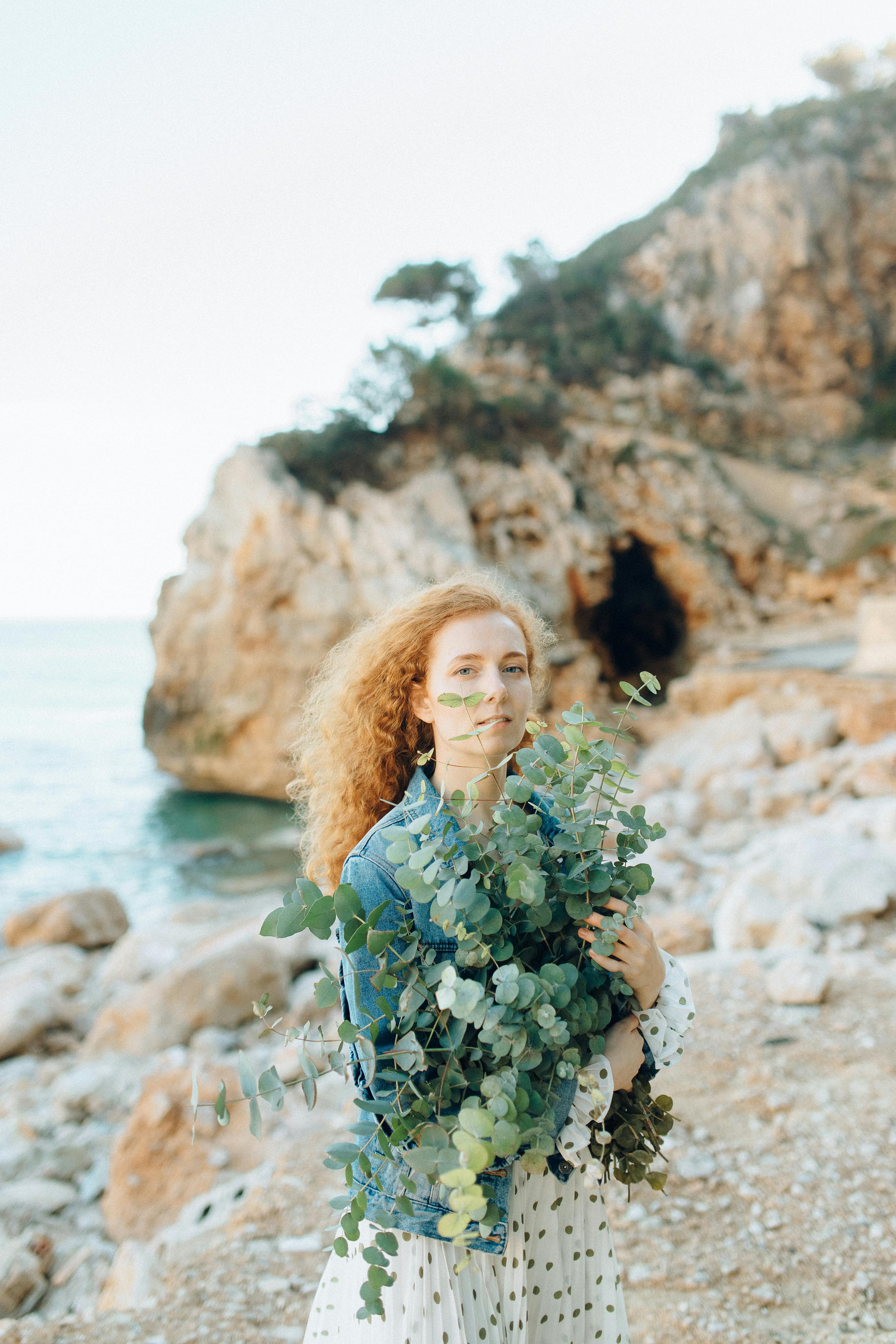 A Woman Standing on the Shore · Free Stock Photo