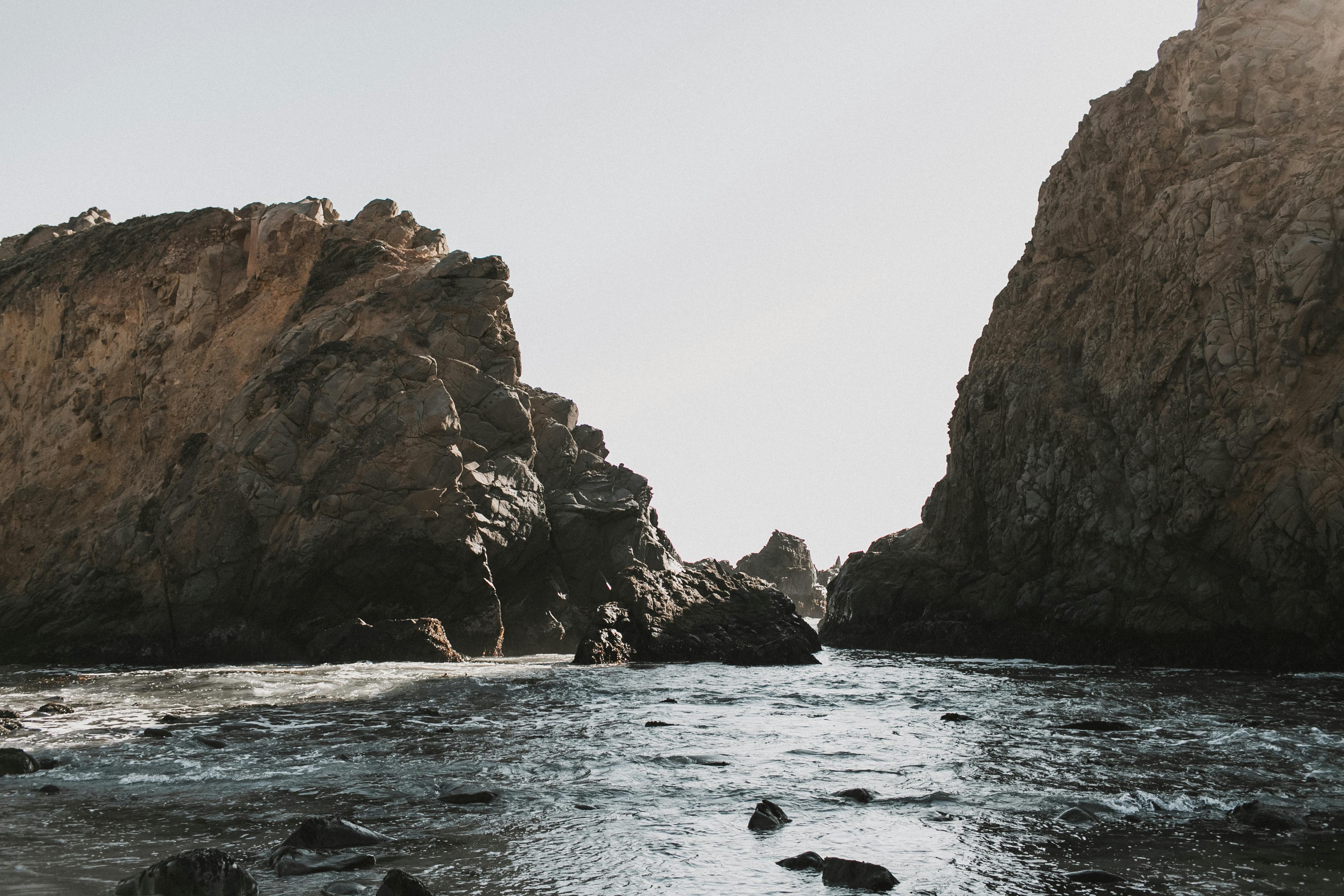 Brown Rock Formation on Seashore · Free Stock Photo