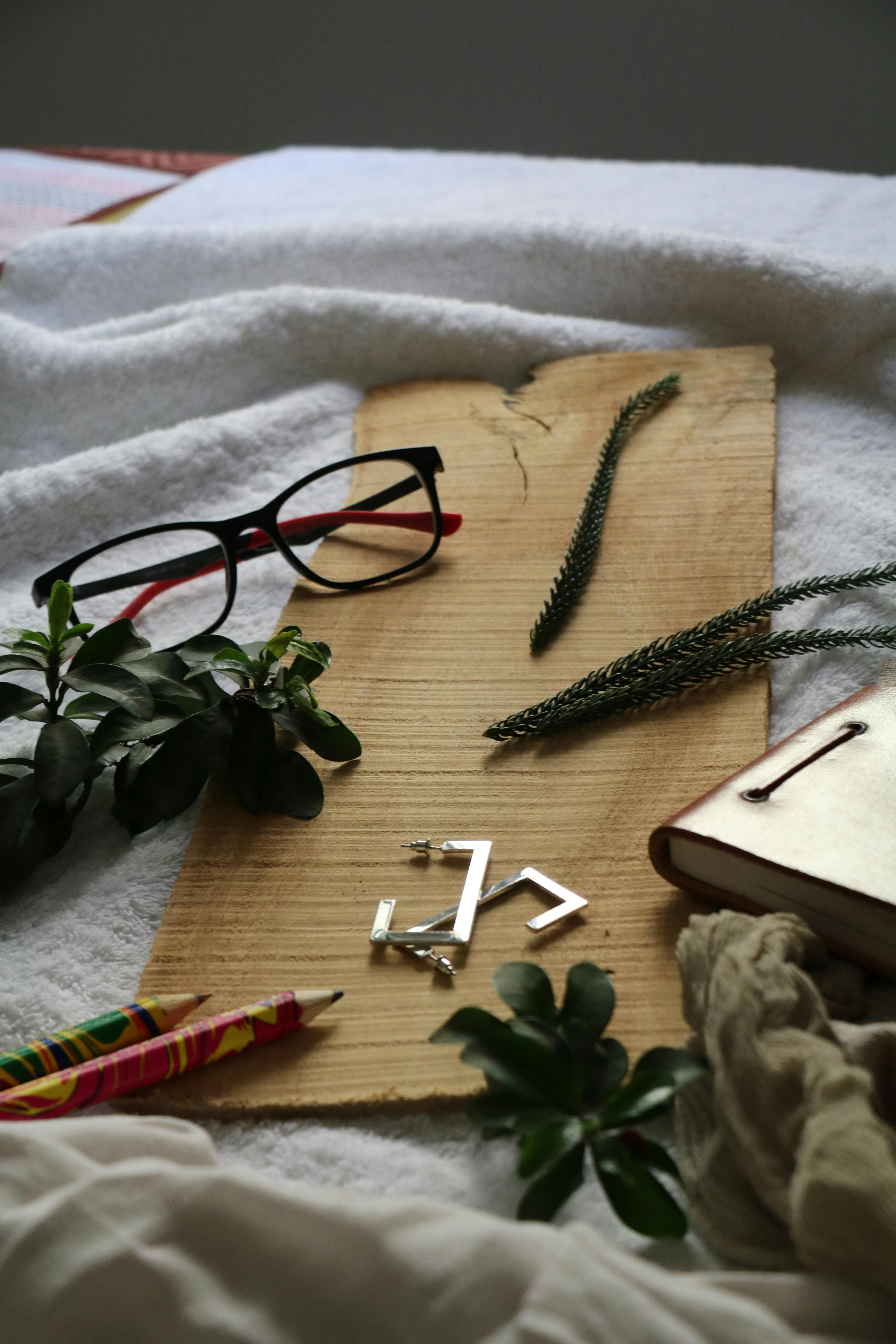Geometric marble shelf with books and decorative vase · Free Stock Photo