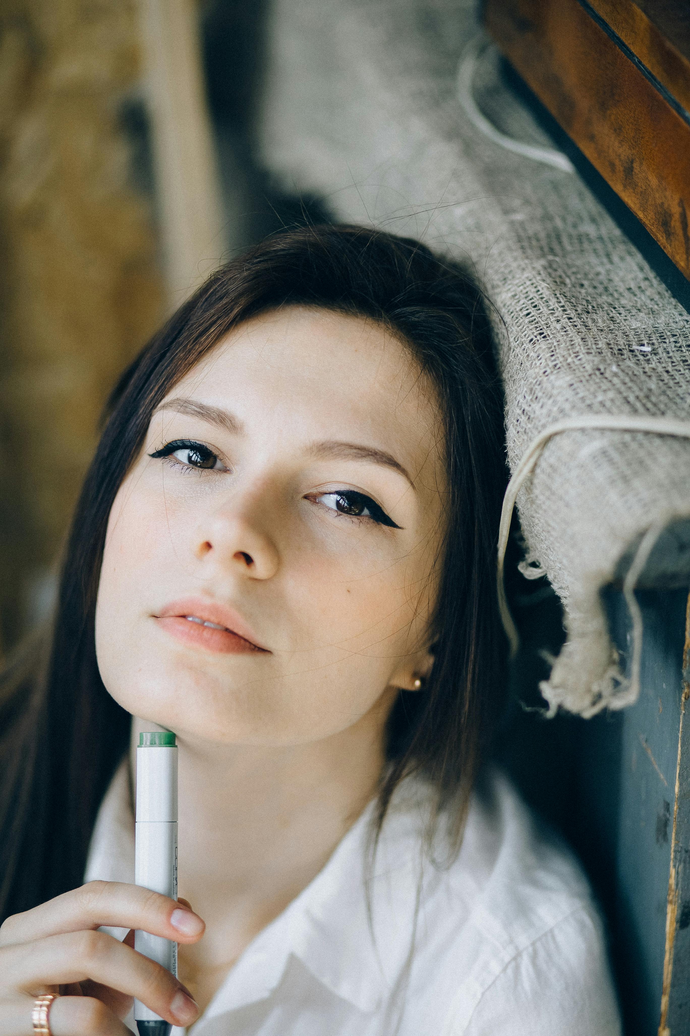 Photo of Woman Looking Pensive · Free Stock Photo