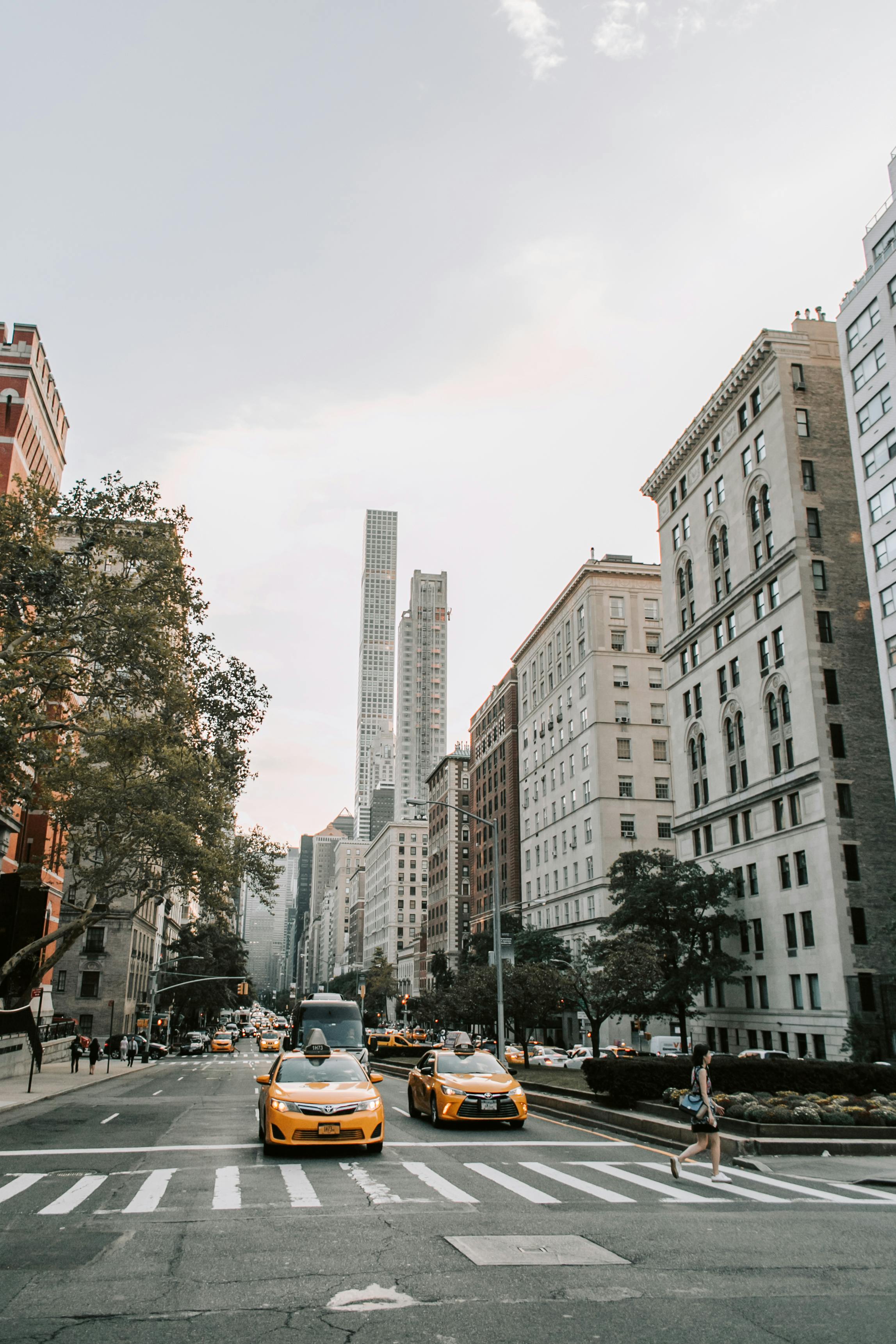 People Walking Near High Rise Buildings · Free Stock Photo