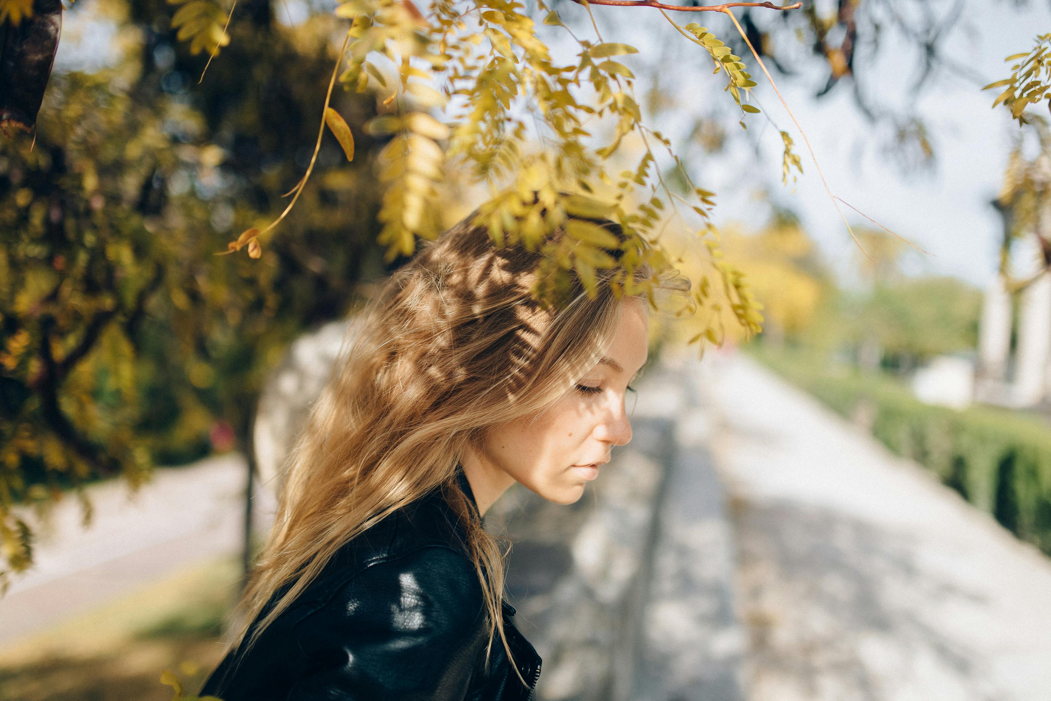 Portrait of Woman Standing on Rooftop · Free Stock Photo