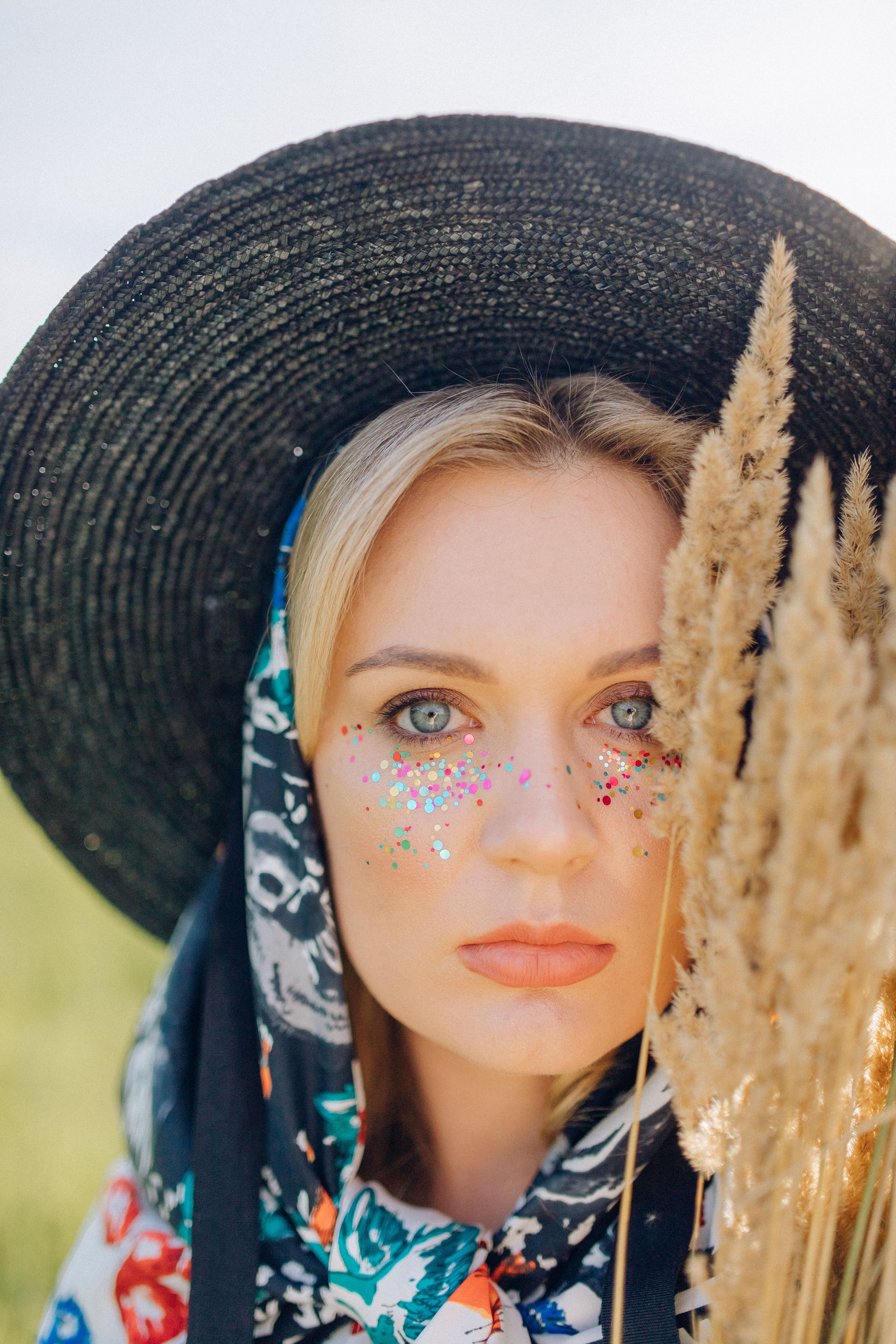 A Woman With Stickers on Her Face · Free Stock Photo