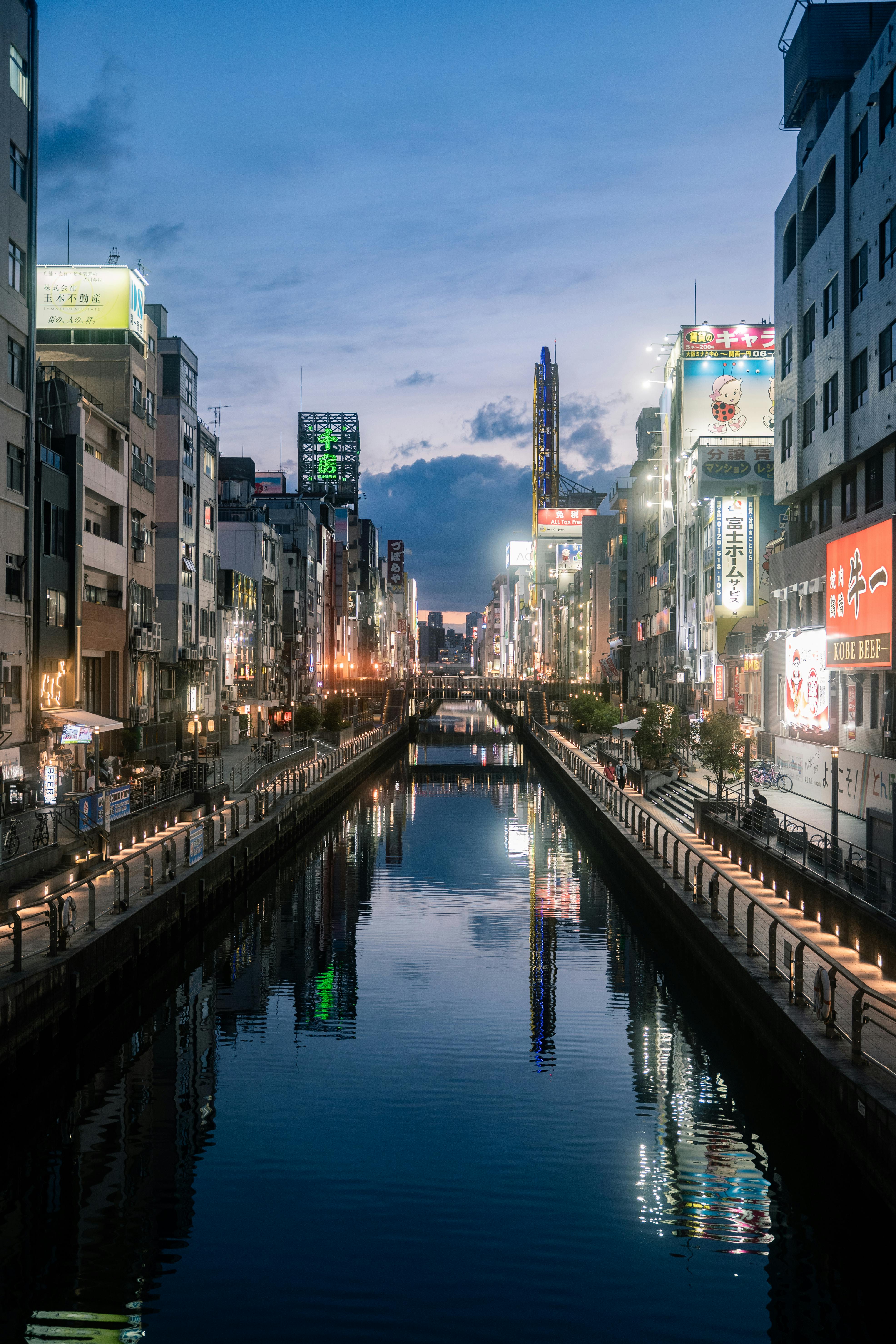 River Between High Rise Buildings · Free Stock Photo
