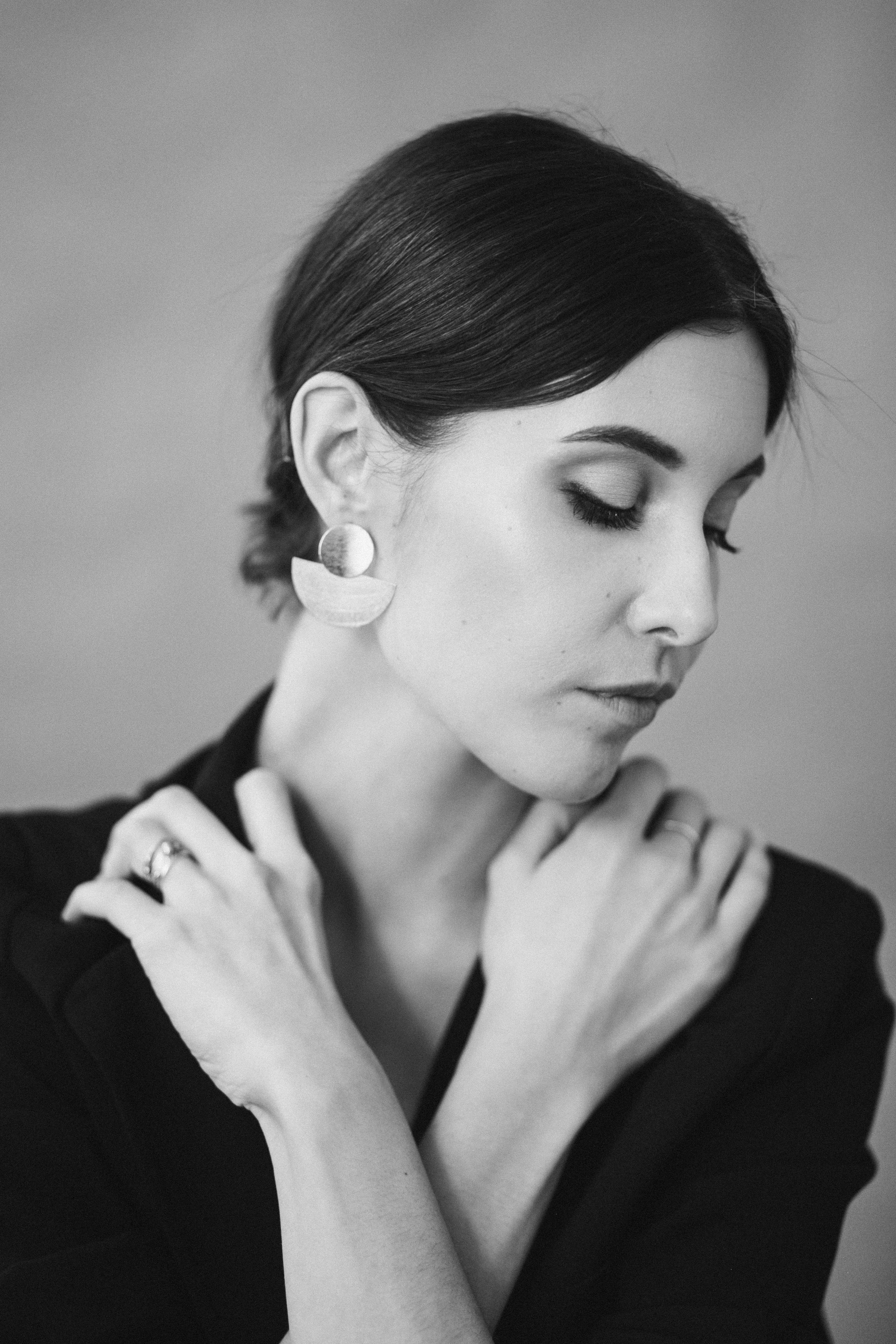 A Pretty Woman in Black Top Posing · Free Stock Photo