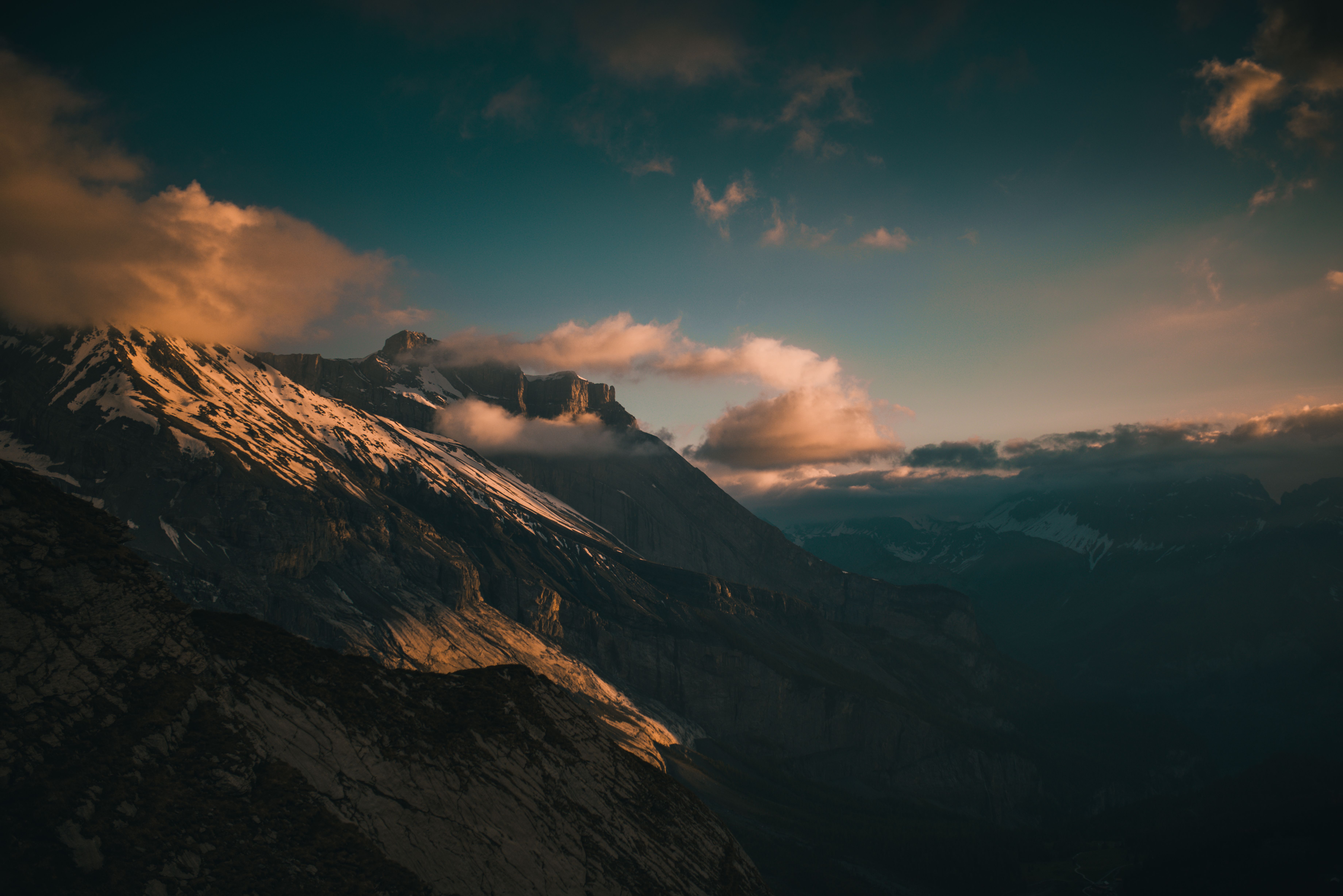 Clouds over mountain ridge in morning · Free Stock Photo
