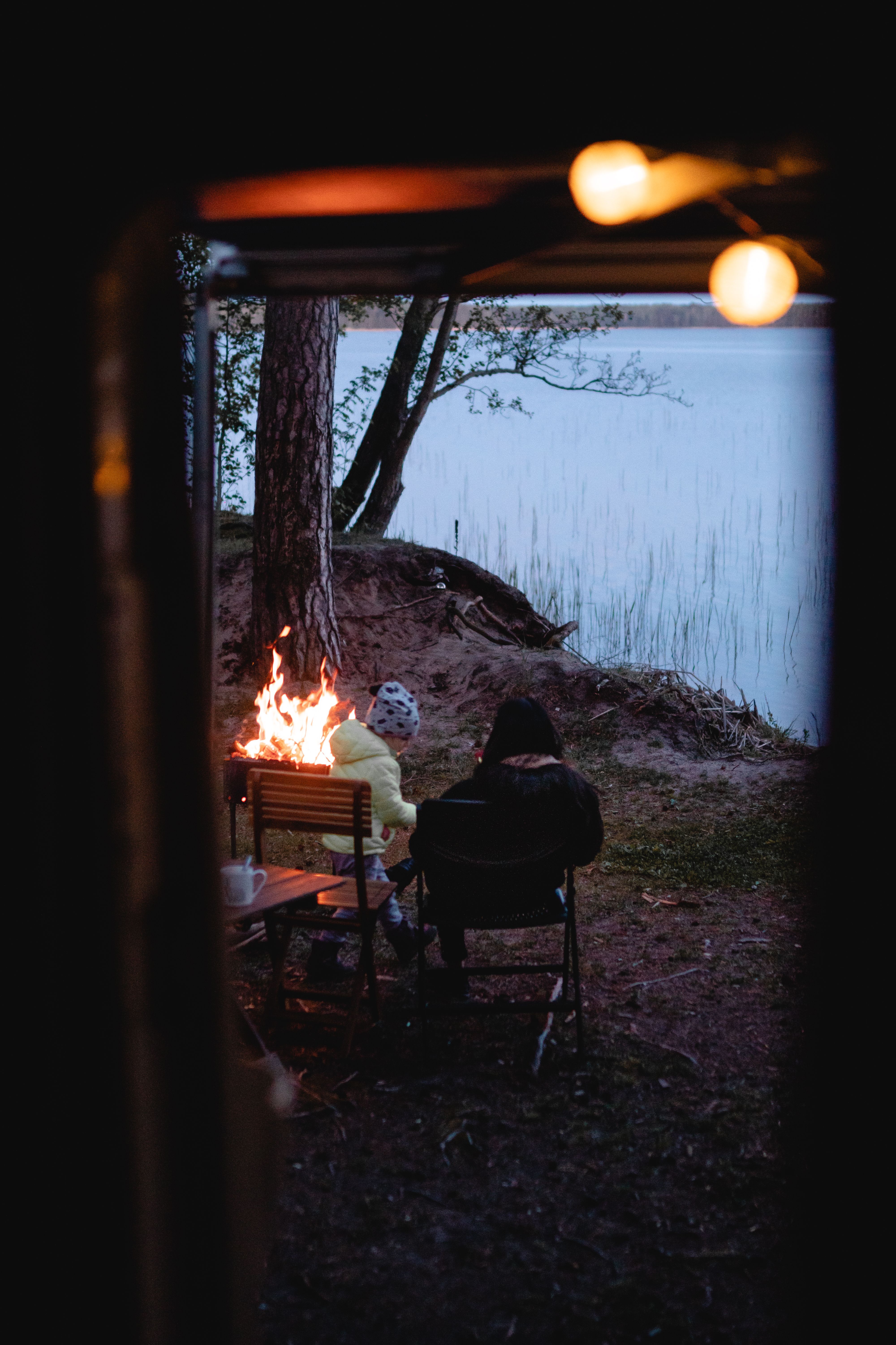 People Sitting Near a Bonfire · Free Stock Photo