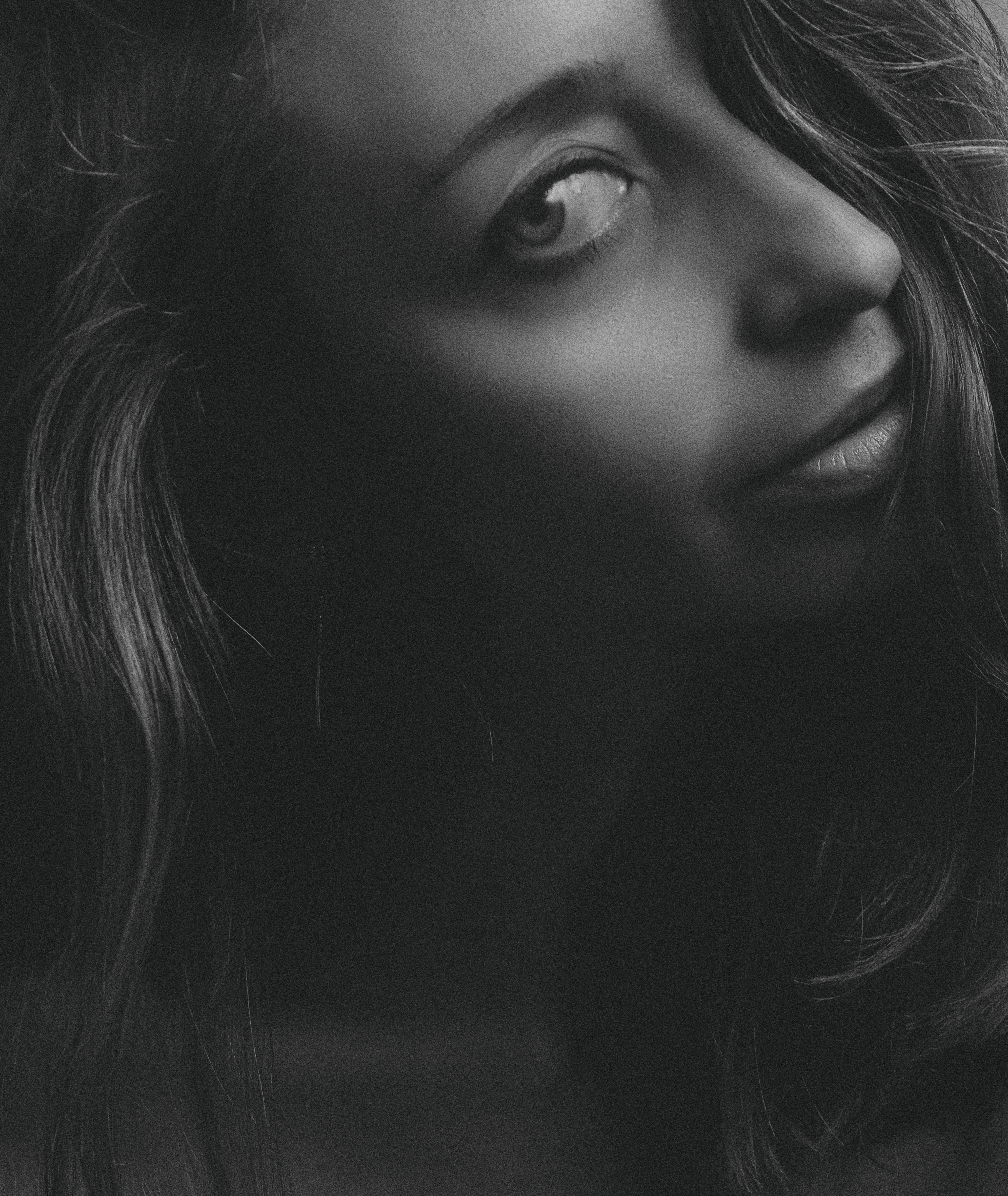 Grayscale Photo of a Woman's Face · Free Stock Photo