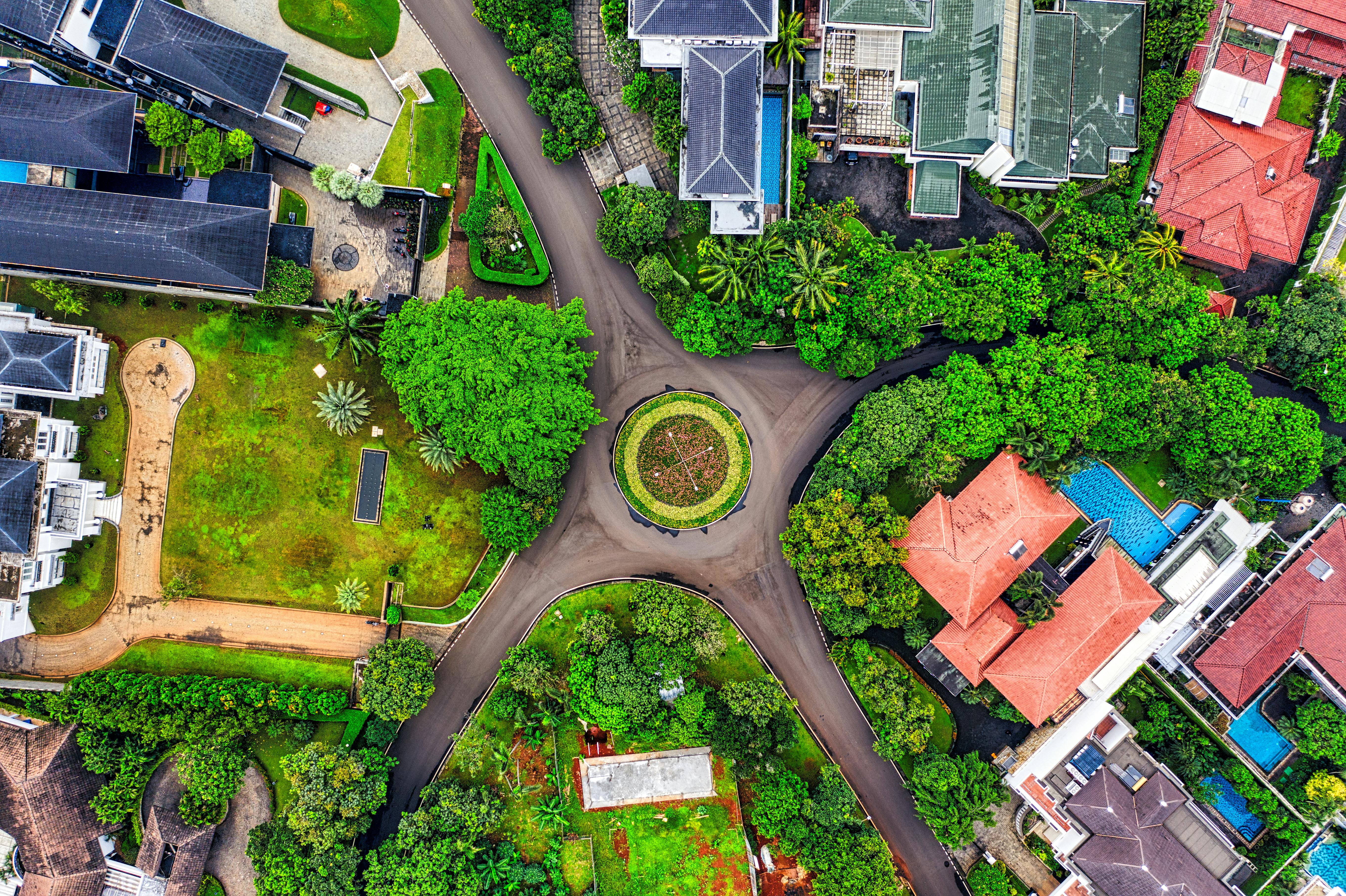 A Roundabout Near Houses and Buildings · Free Stock Photo