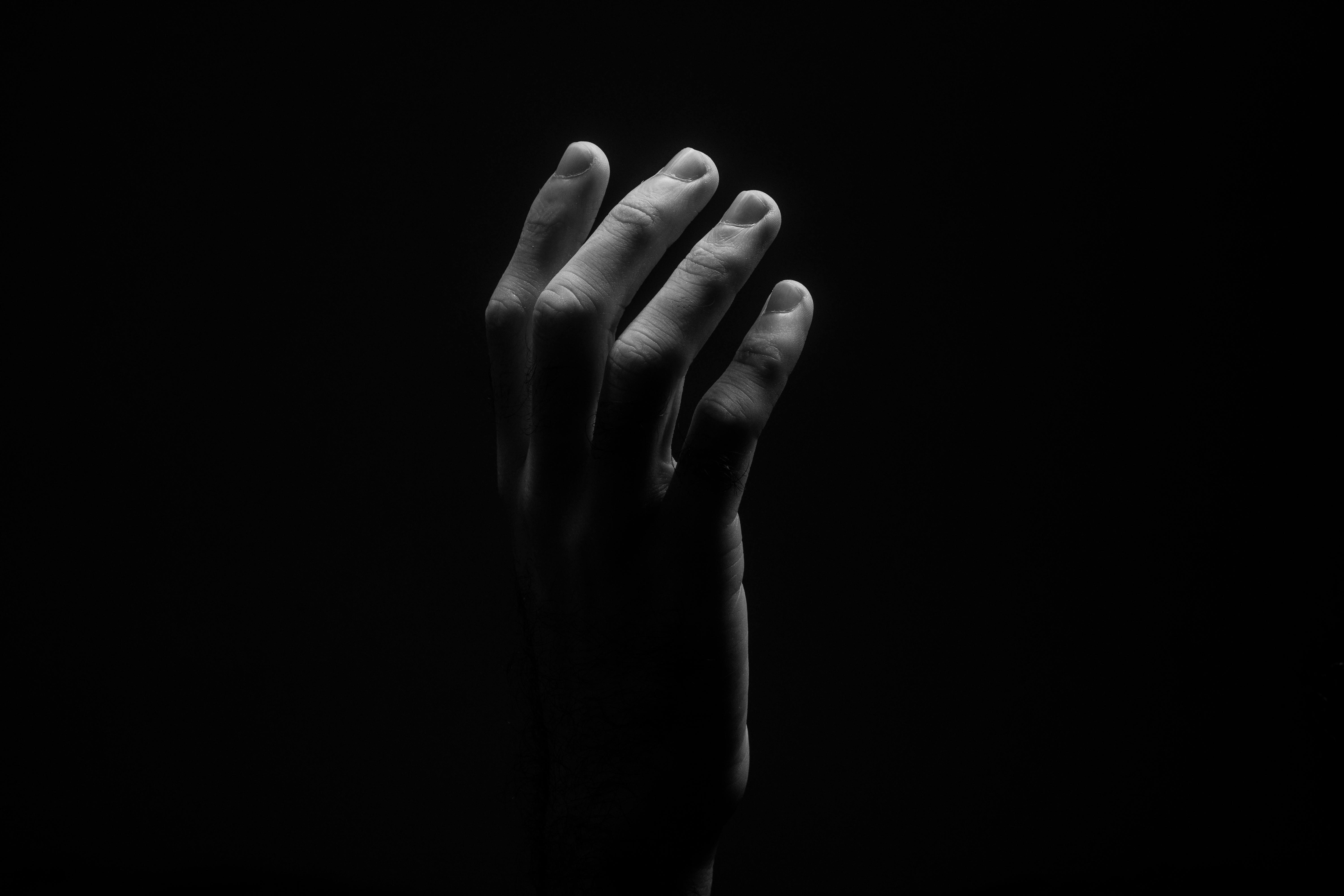 Photo of Hand with Dark Paint · Free Stock Photo
