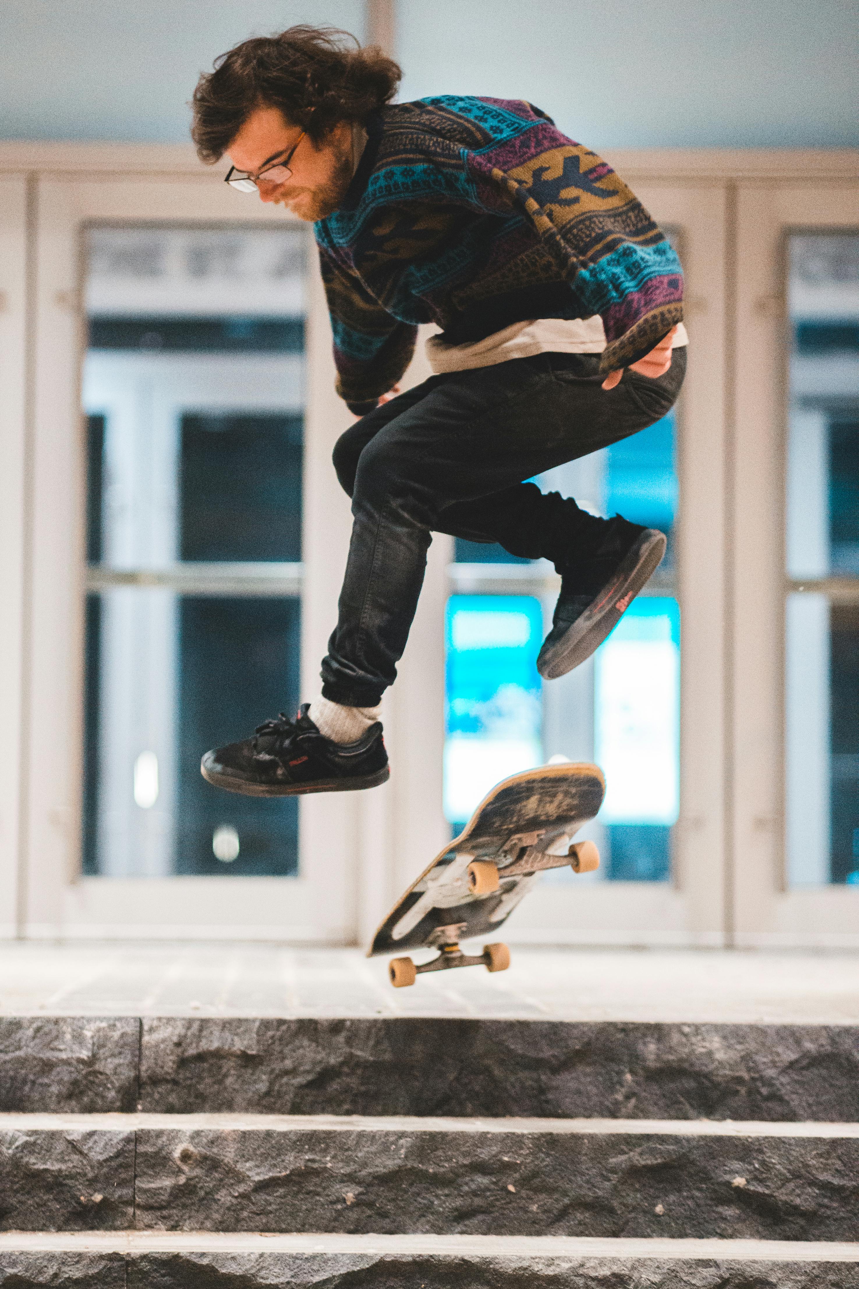 Person Kickflipping · Free Stock Photo