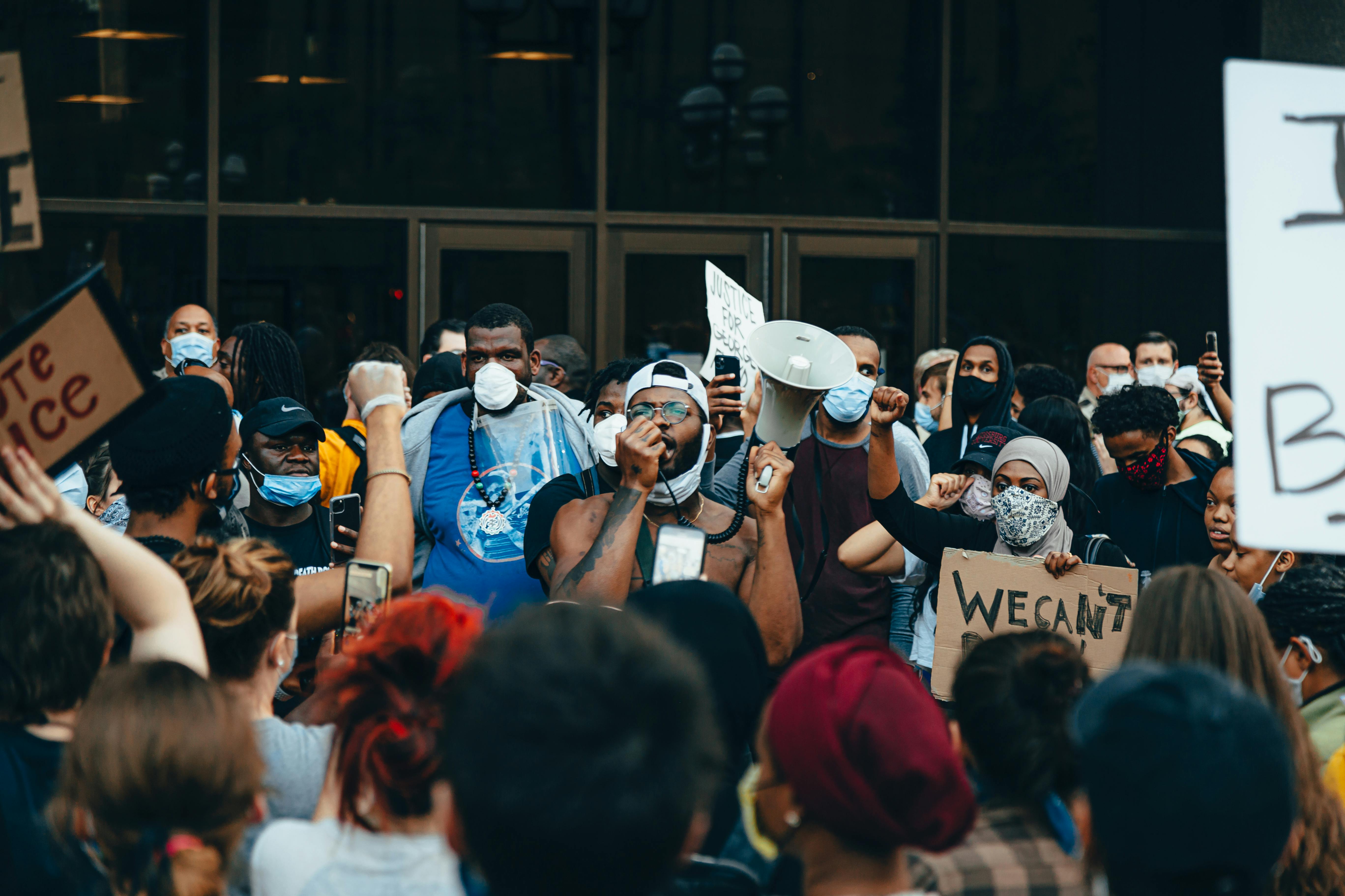 Crowd of Protesters Holding Signs · Free Stock Photo