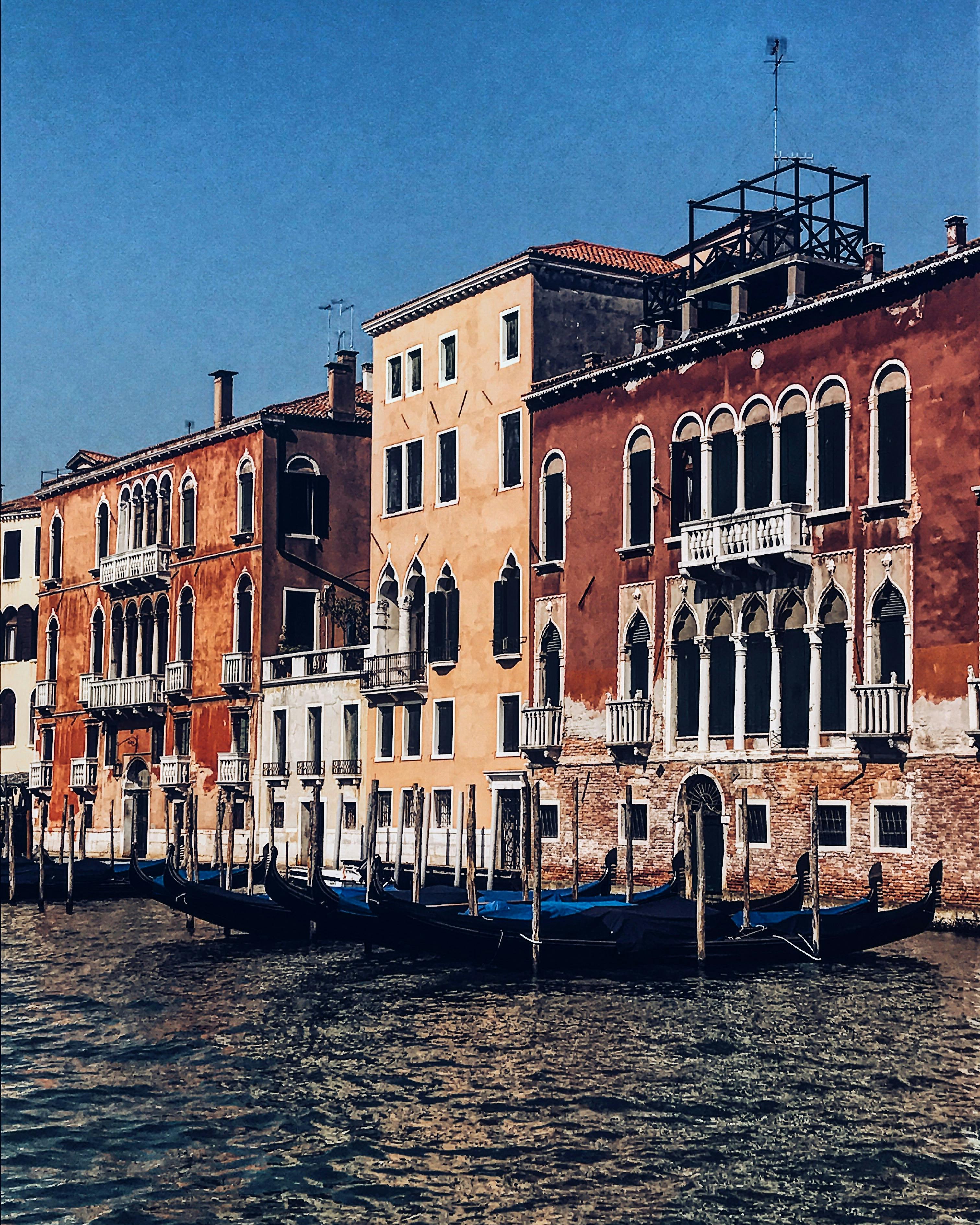 Gondola dock against beautiful ancient buildings of Venice · Free Stock ...