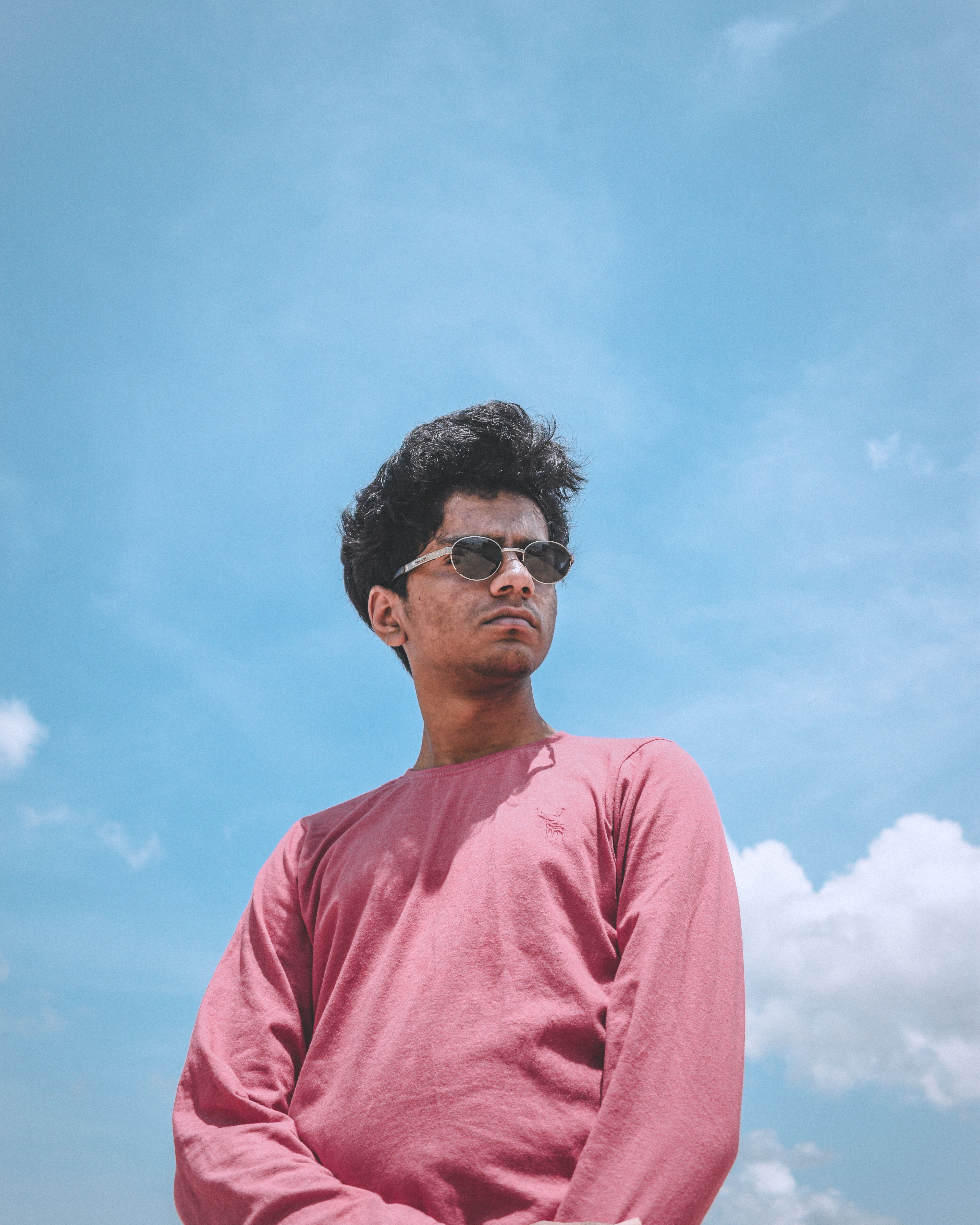 Stylish ethnic man posing on camera · Free Stock Photo