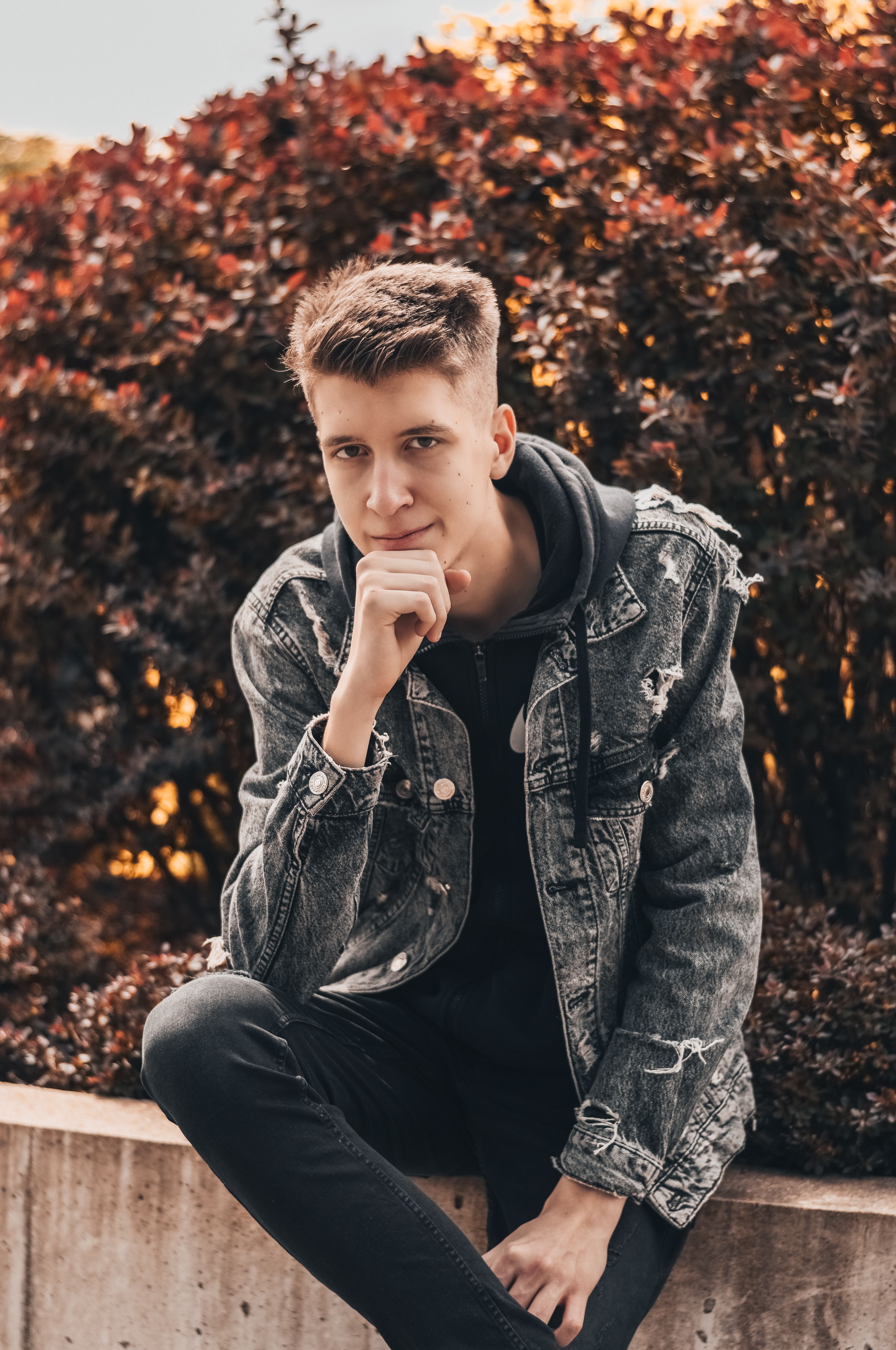 A Boy Wearing Denim Jacket · Free Stock Photo