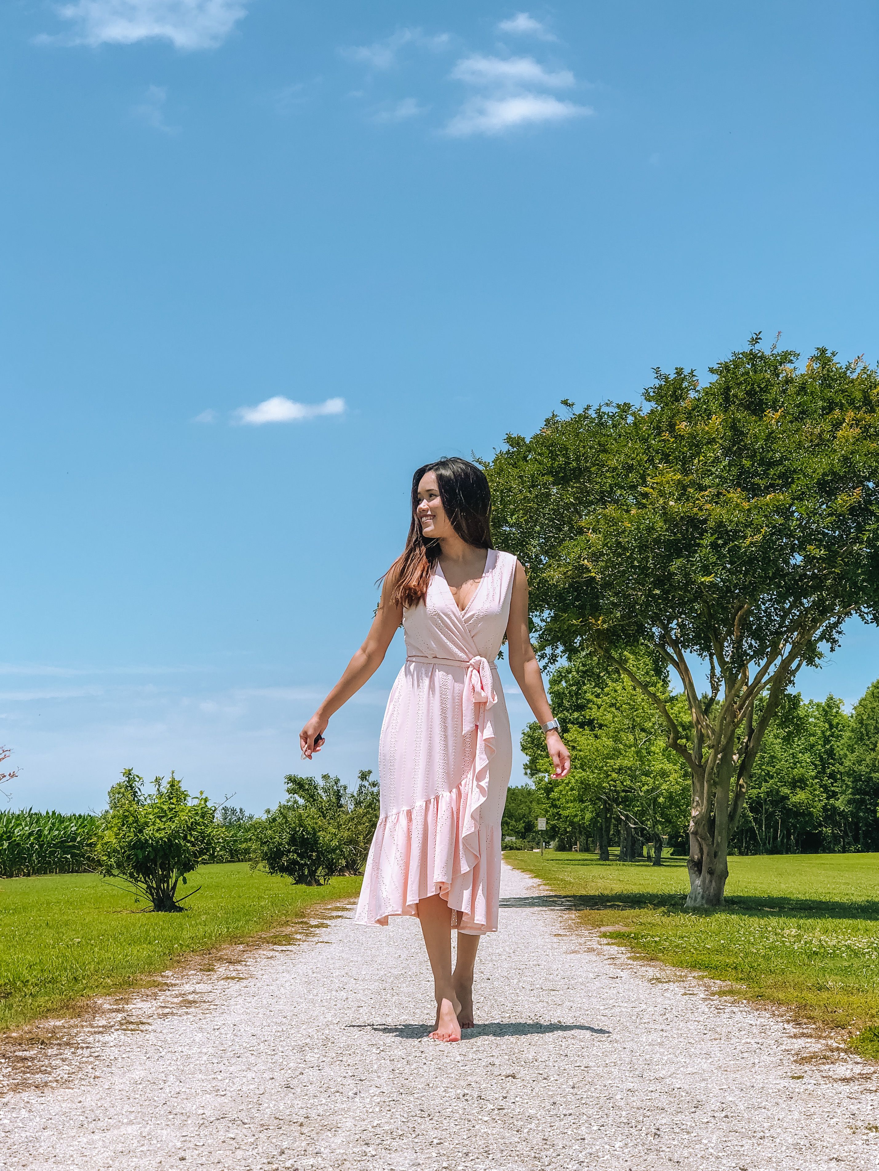 Joyful woman walking in green park in summer day · Free Stock Photo