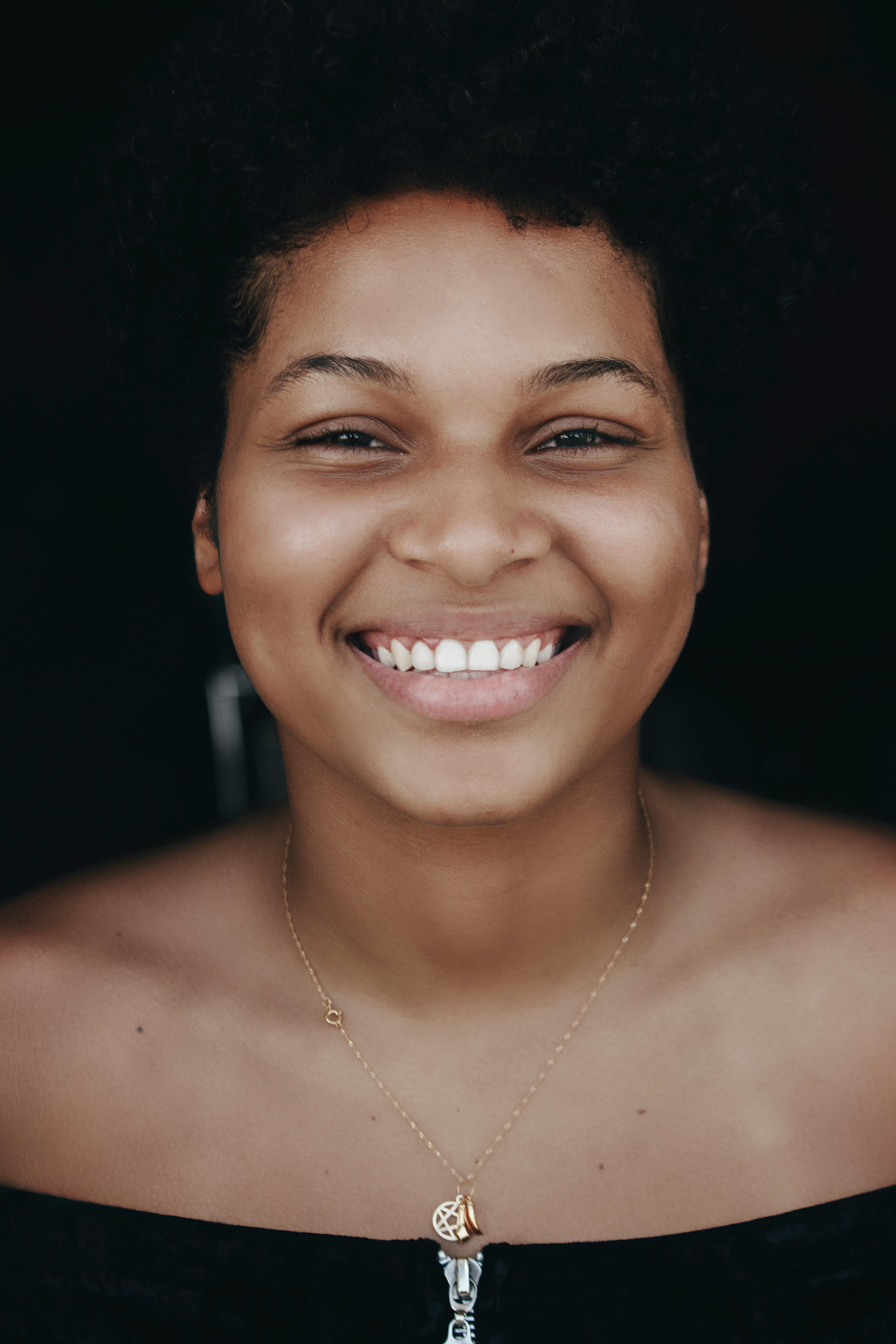 A Portrait of a Smiling Woman · Free Stock Photo
