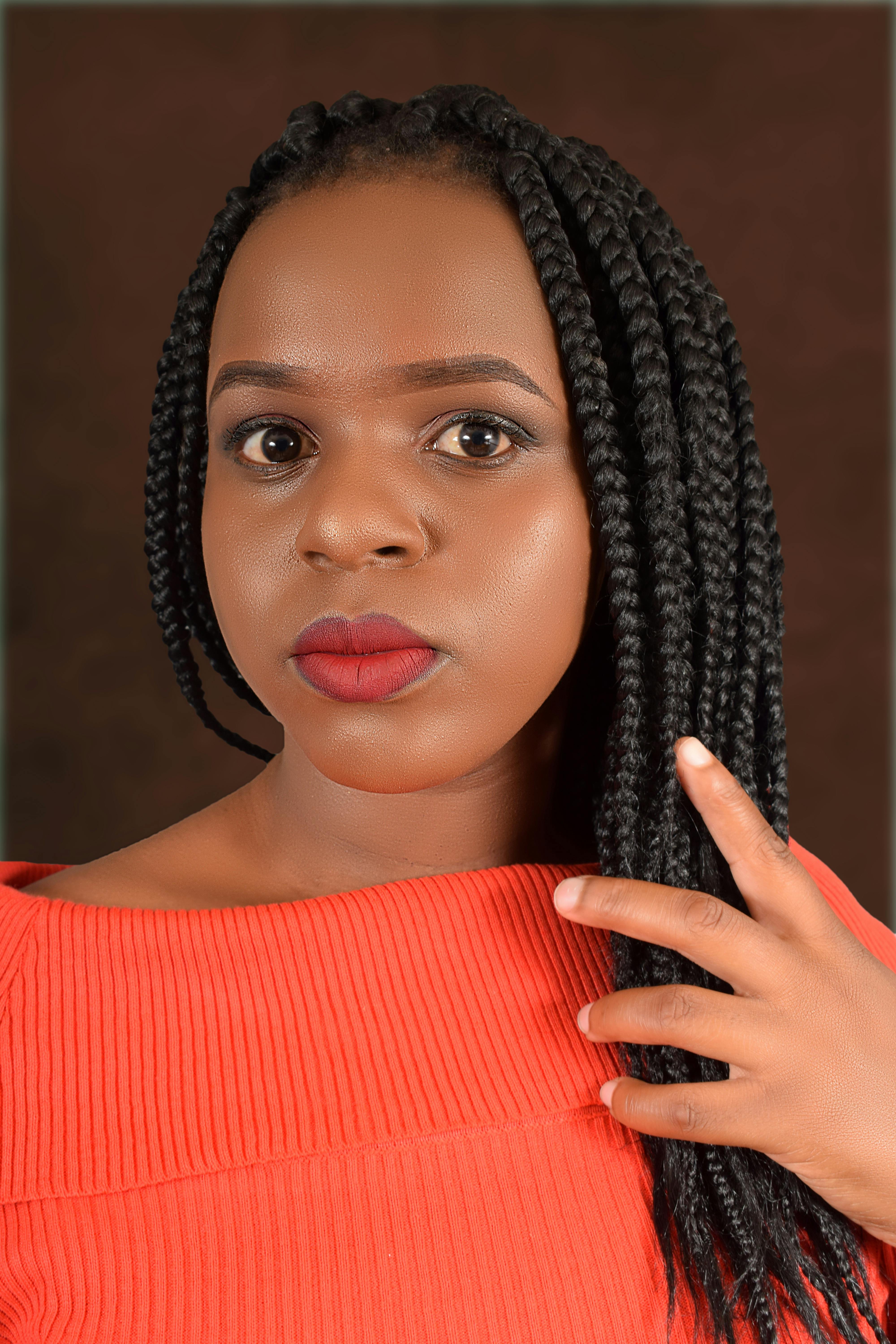 Stylish black lady with Afro braids · Free Stock Photo